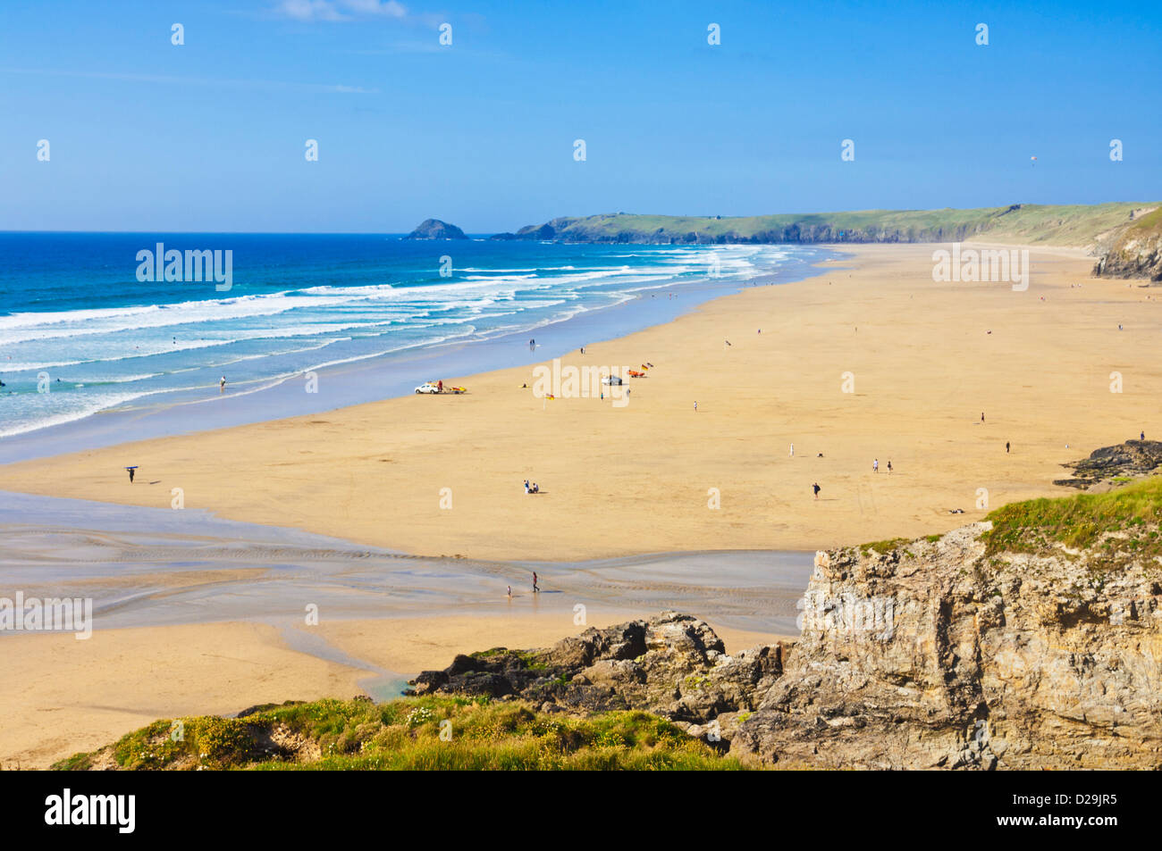 Holidaymakers on the wide long sandy beach at Perranporth Cornwall ...