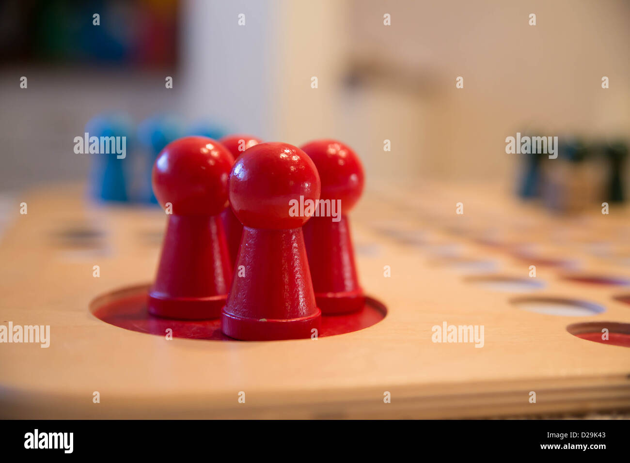 Zoomed red buttons on table game field corner Stock Photo - Alamy
