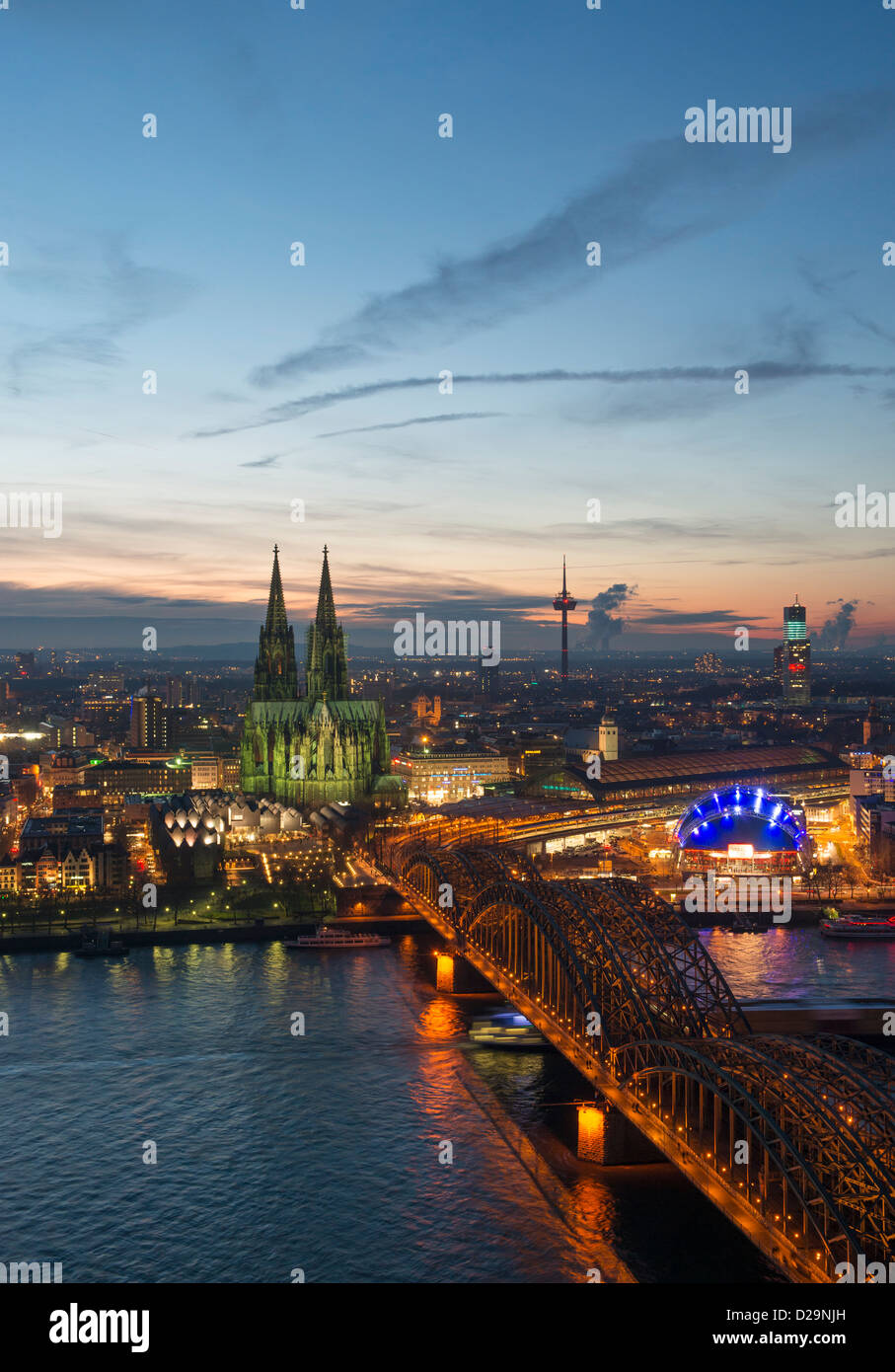 Evening view of skyline of Cologne, Germany with floodlit Cathedral ...