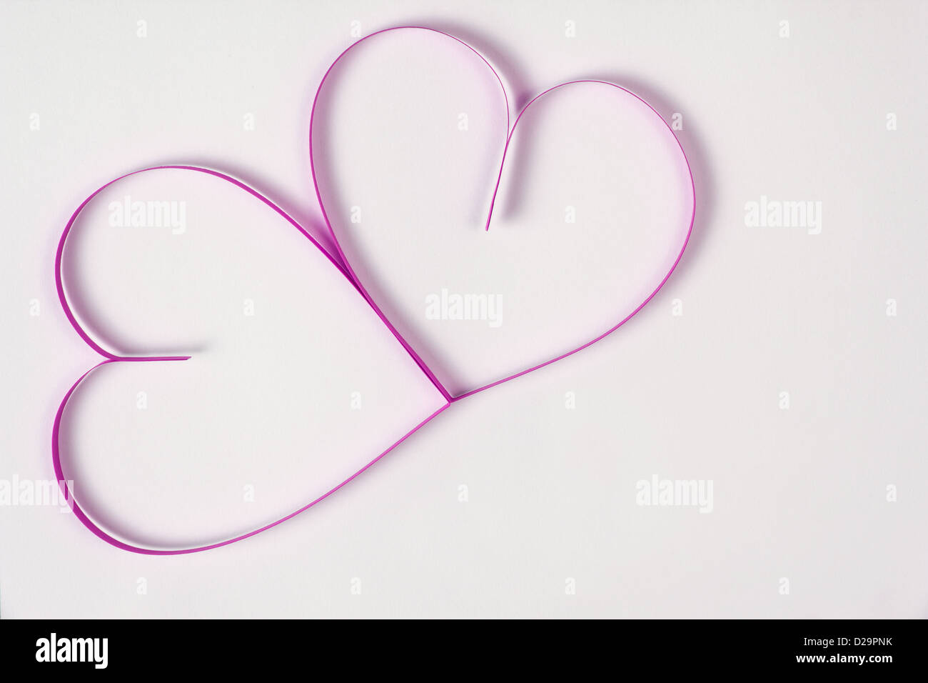 two beautiful paper hearts, valentines day background Stock Photo - Alamy