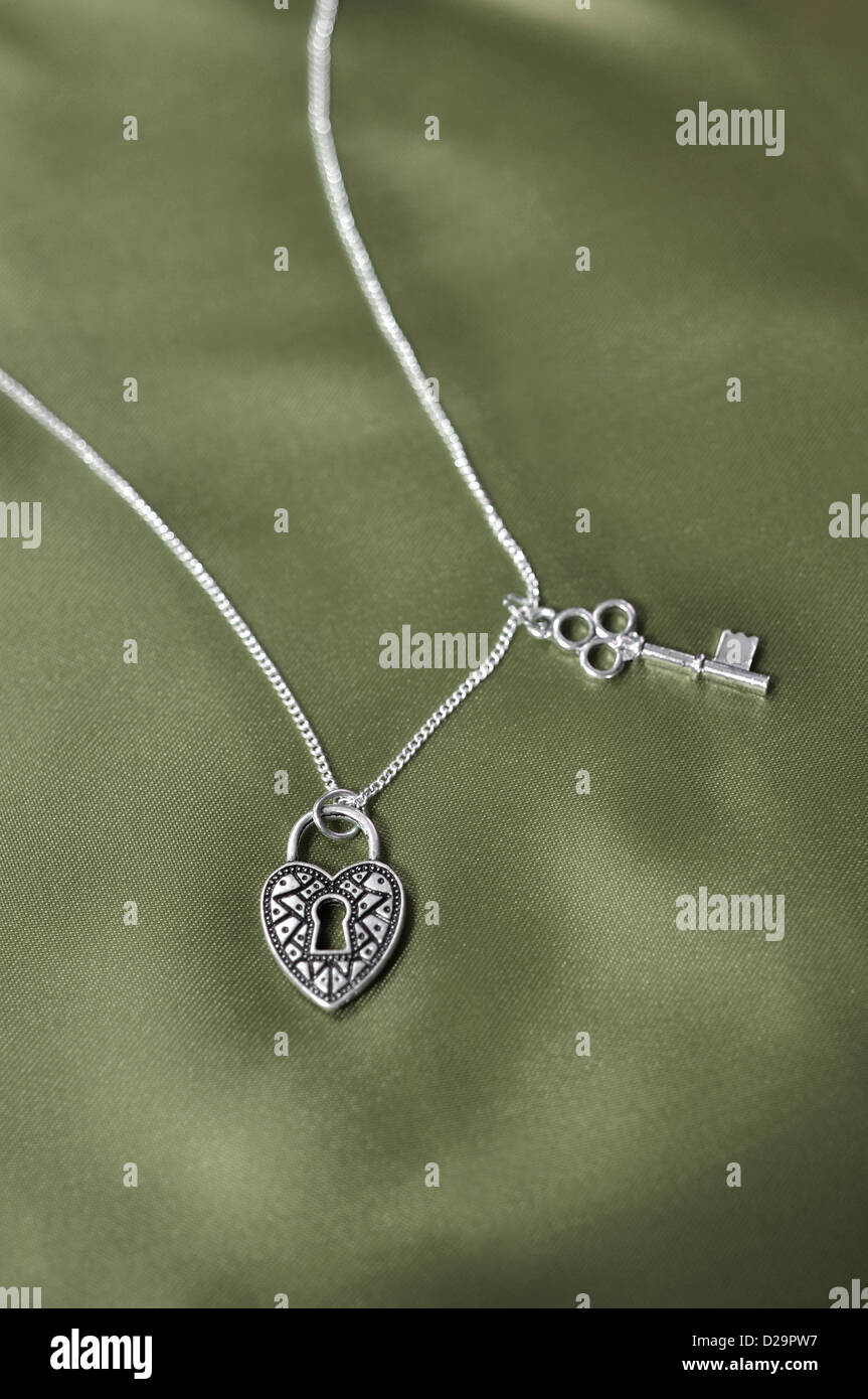 Chain and pendant - lock and key Stock Photo - Alamy