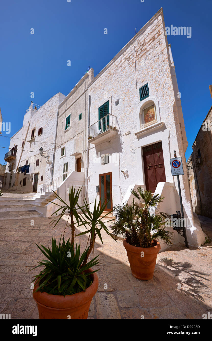 The medieval narrow streets of Ostuni, The White Town, Puglia, Italy ...