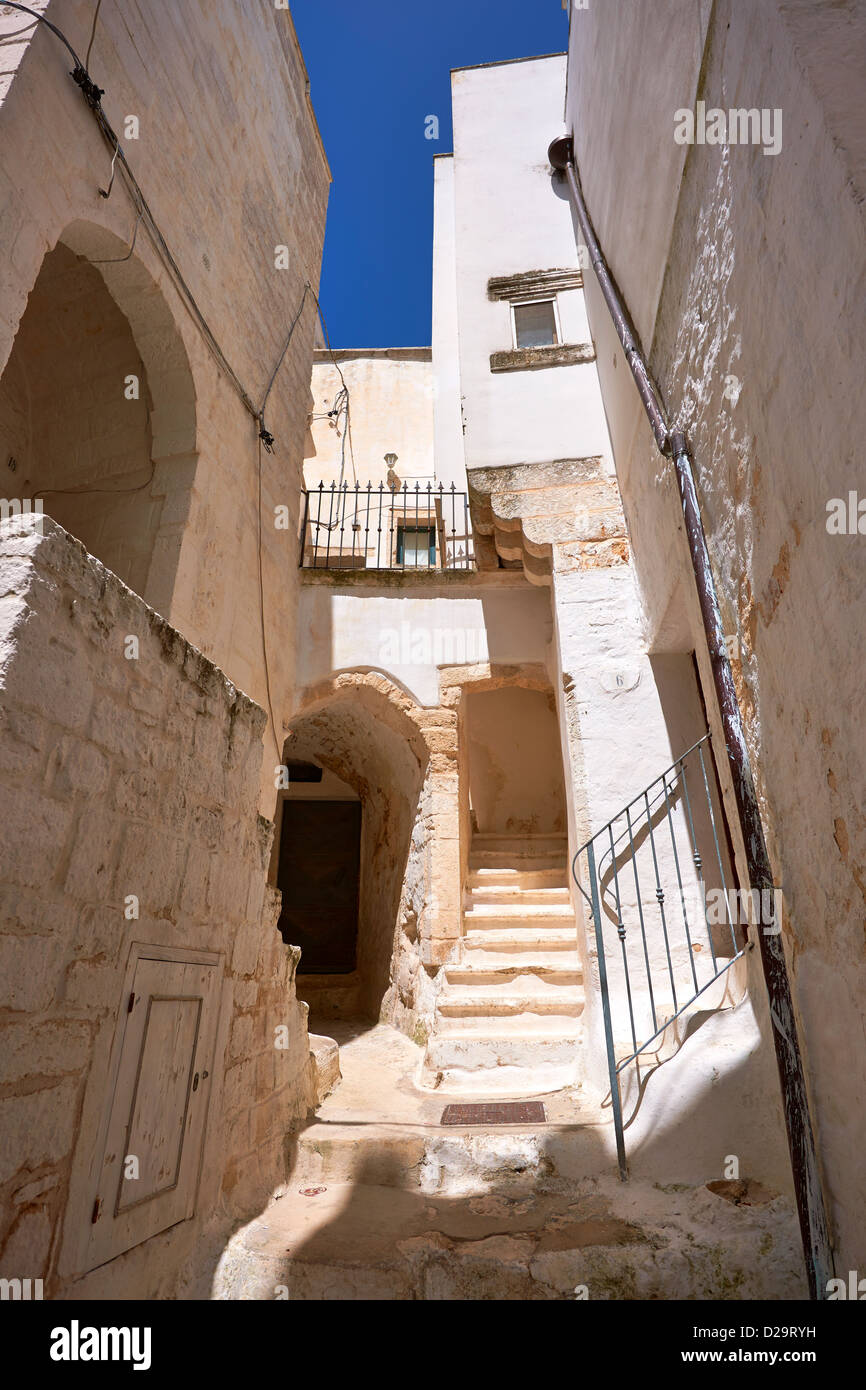 The medieval narrow streets of Ostuni, The White Town, Puglia, Italy ...