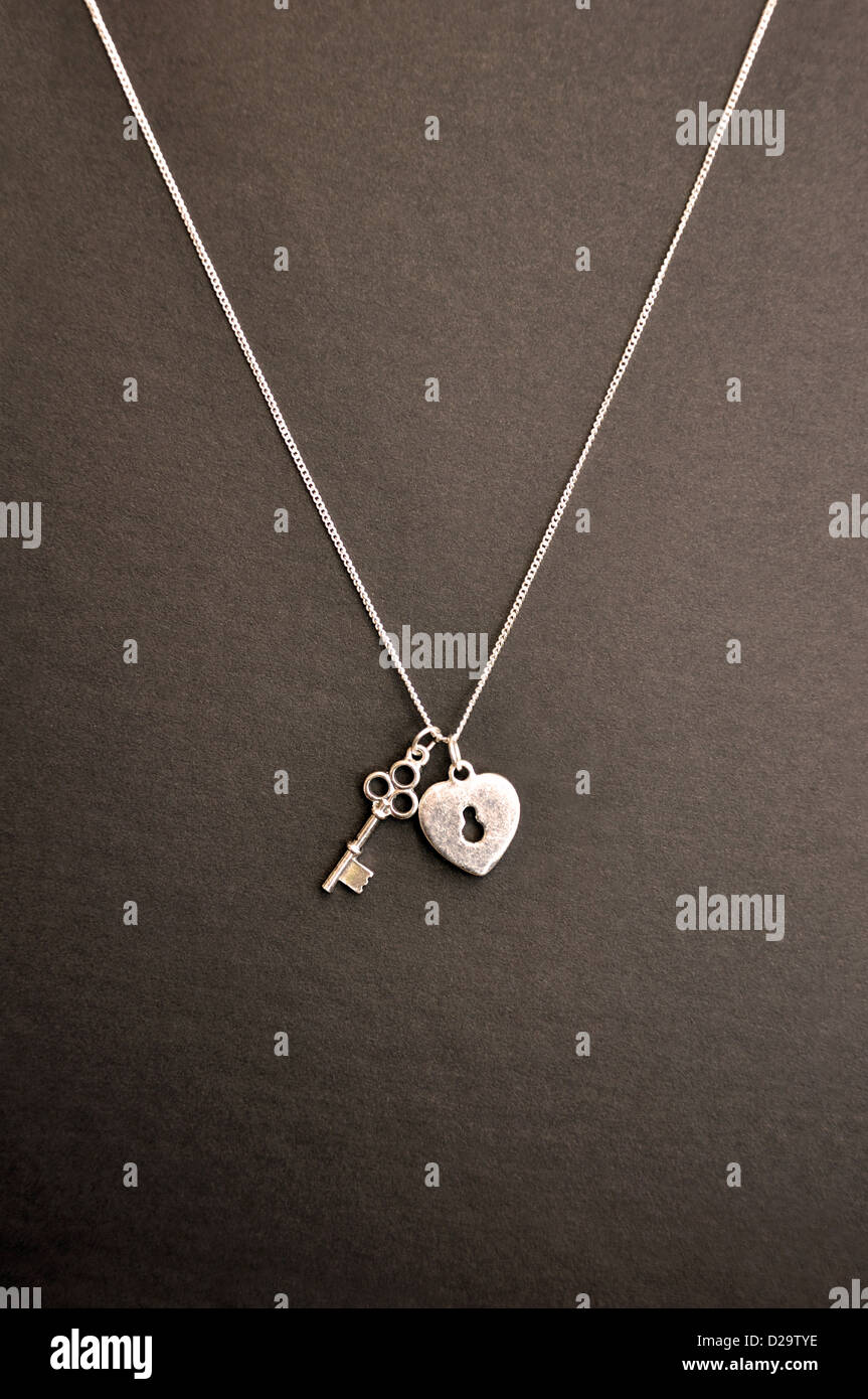 Chain and pendant - lock and key Stock Photo - Alamy