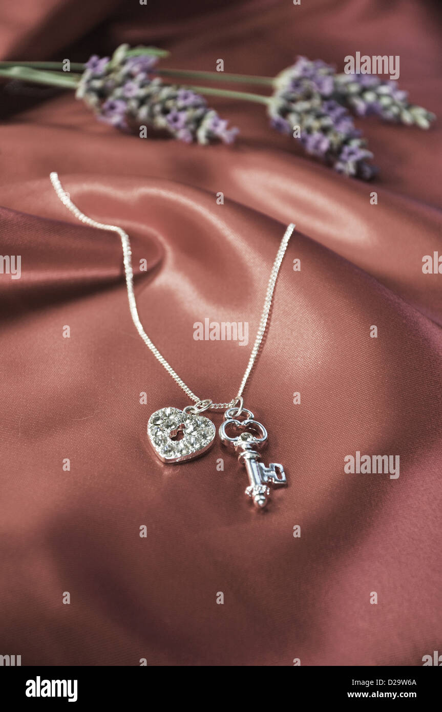 Chain and pendant - lock and key Stock Photo - Alamy