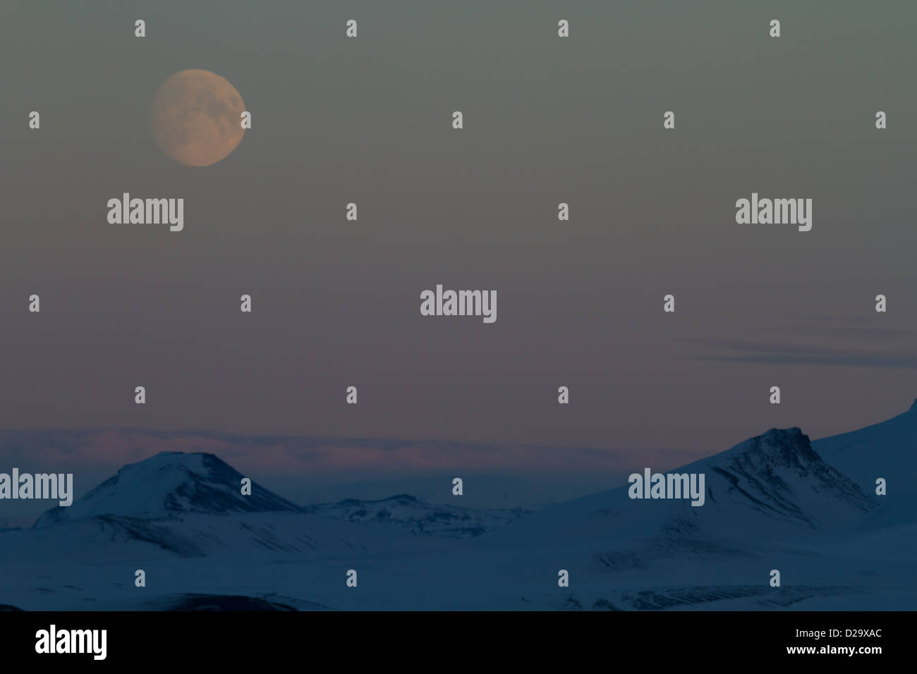 Moon and mountains in Iceland Stock Photo - Alamy