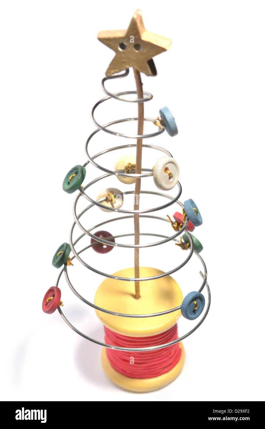 Sewing themed wire Christmas tree Stock Photo - Alamy