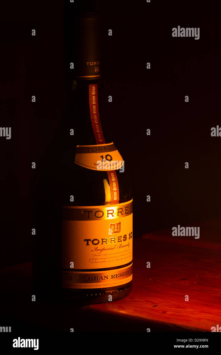 Brandy in candle light Stock Photo - Alamy