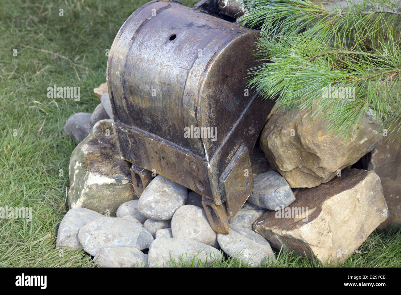 bucket and stones Stock Photo - Alamy