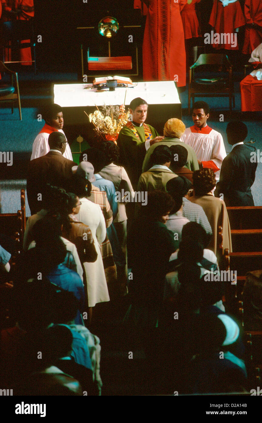 Mass In Church With Congregation. Holy Communion Being Given Stock ...