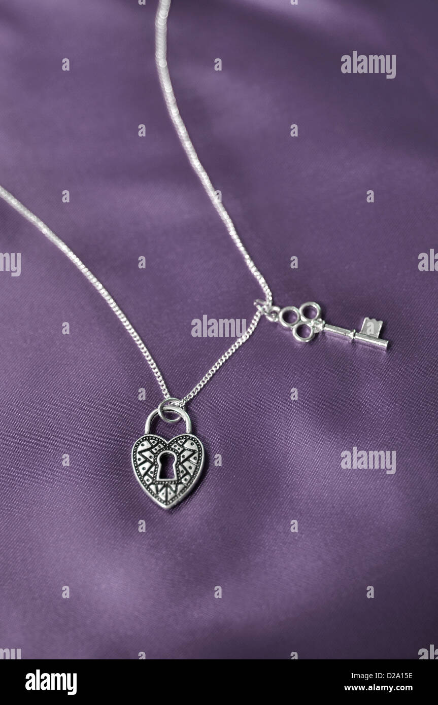 Chain and pendant - lock and key Stock Photo - Alamy