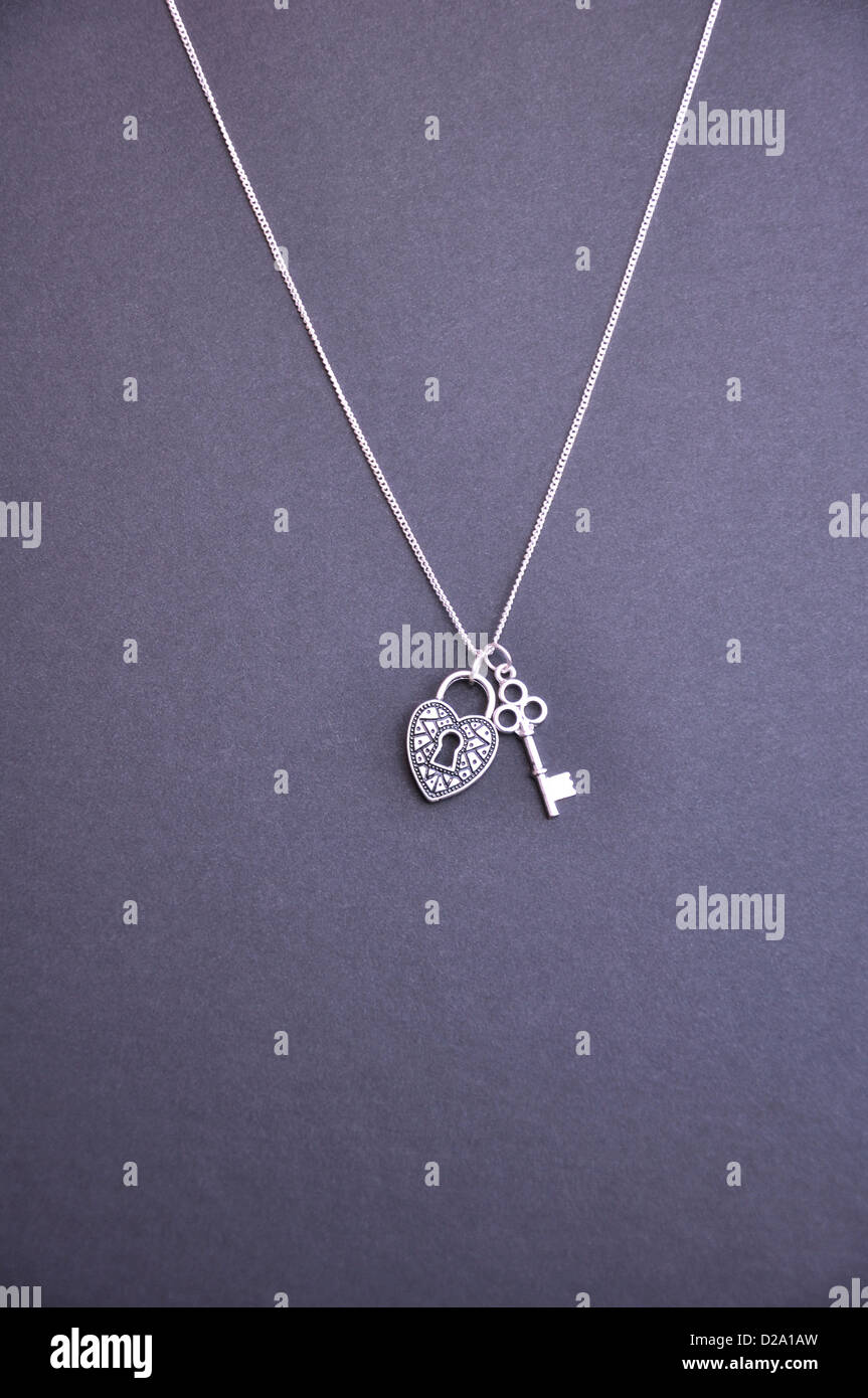 Chain and pendant - lock and key Stock Photo - Alamy