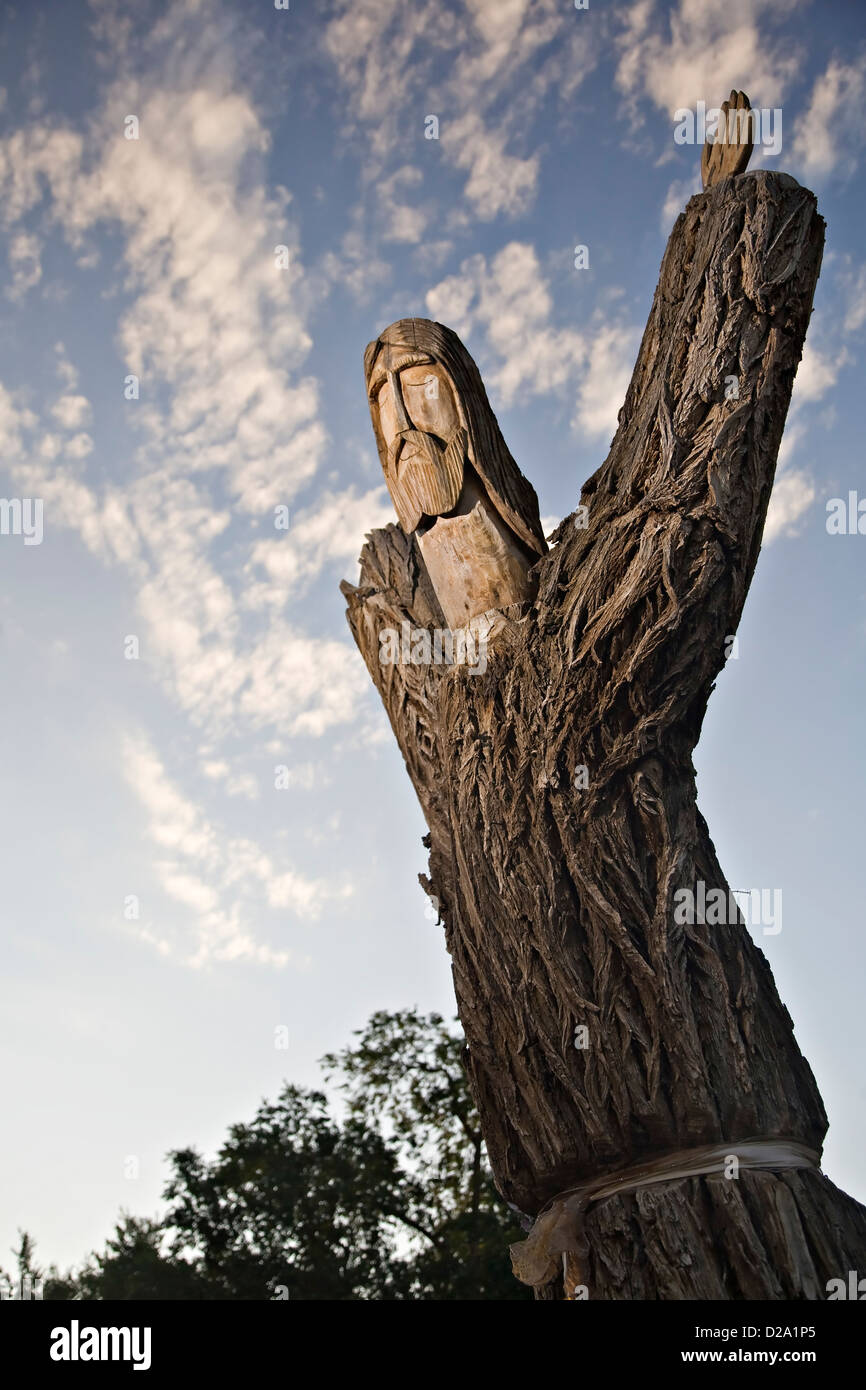 Statue of Jesus Christ carved from a tree trunk and branches in Los ...