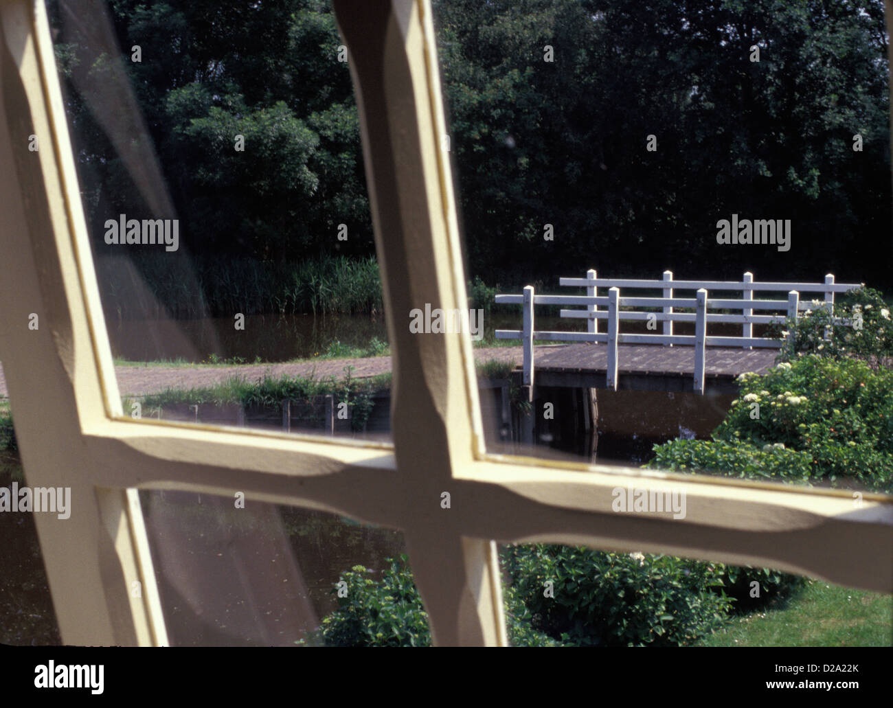Netherlands. Amsterdam. Watergang. View Through Window. Canal. Bridge ...