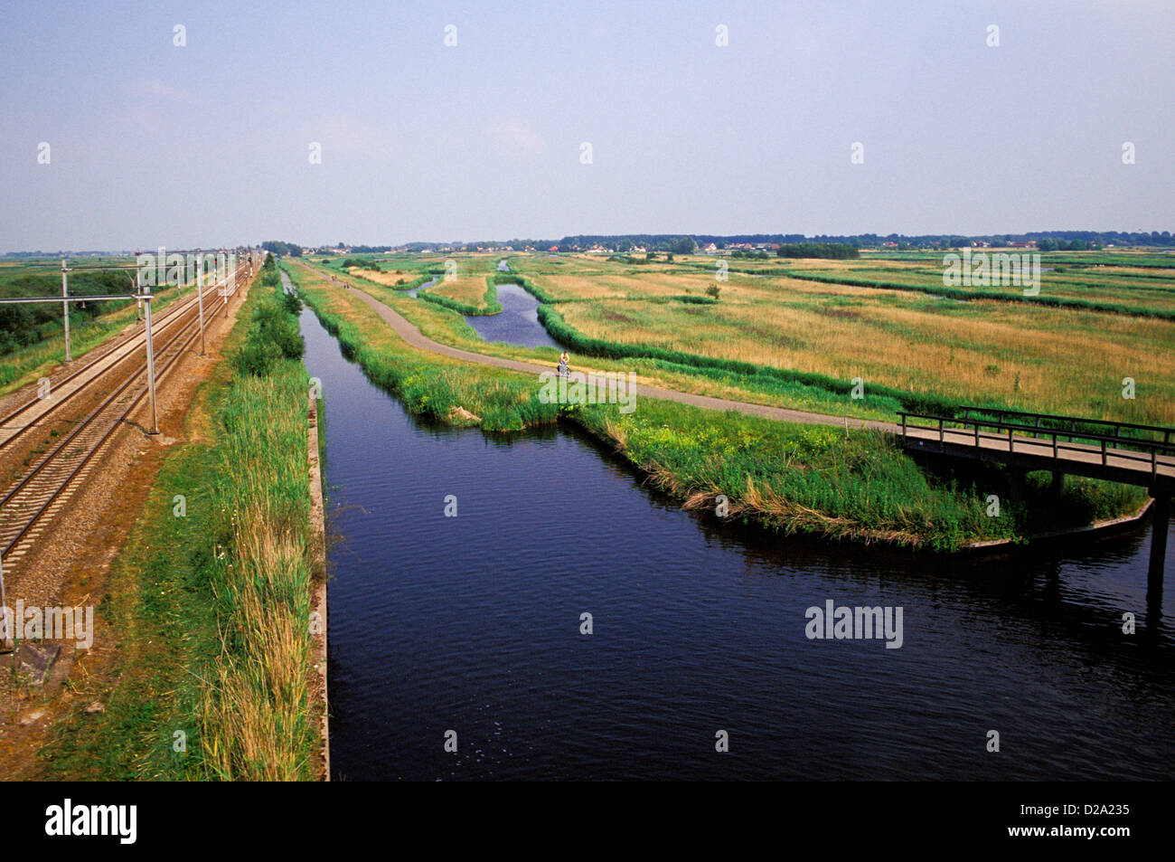 Netherlands. Amsterdam. Canal. Train Tracks Stock Photo - Alamy