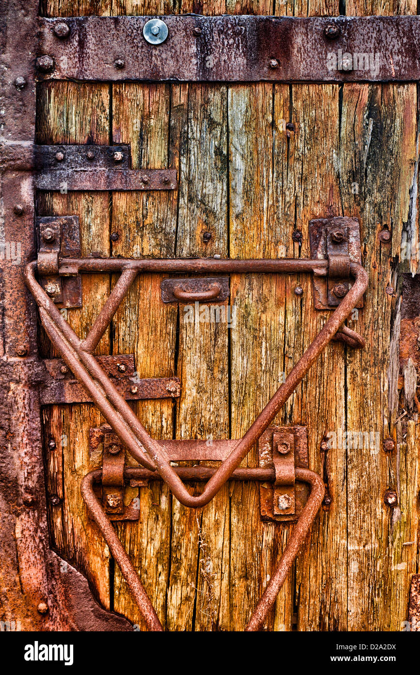 Sea worn door with corroded steal triangle hangers attached. Great ...