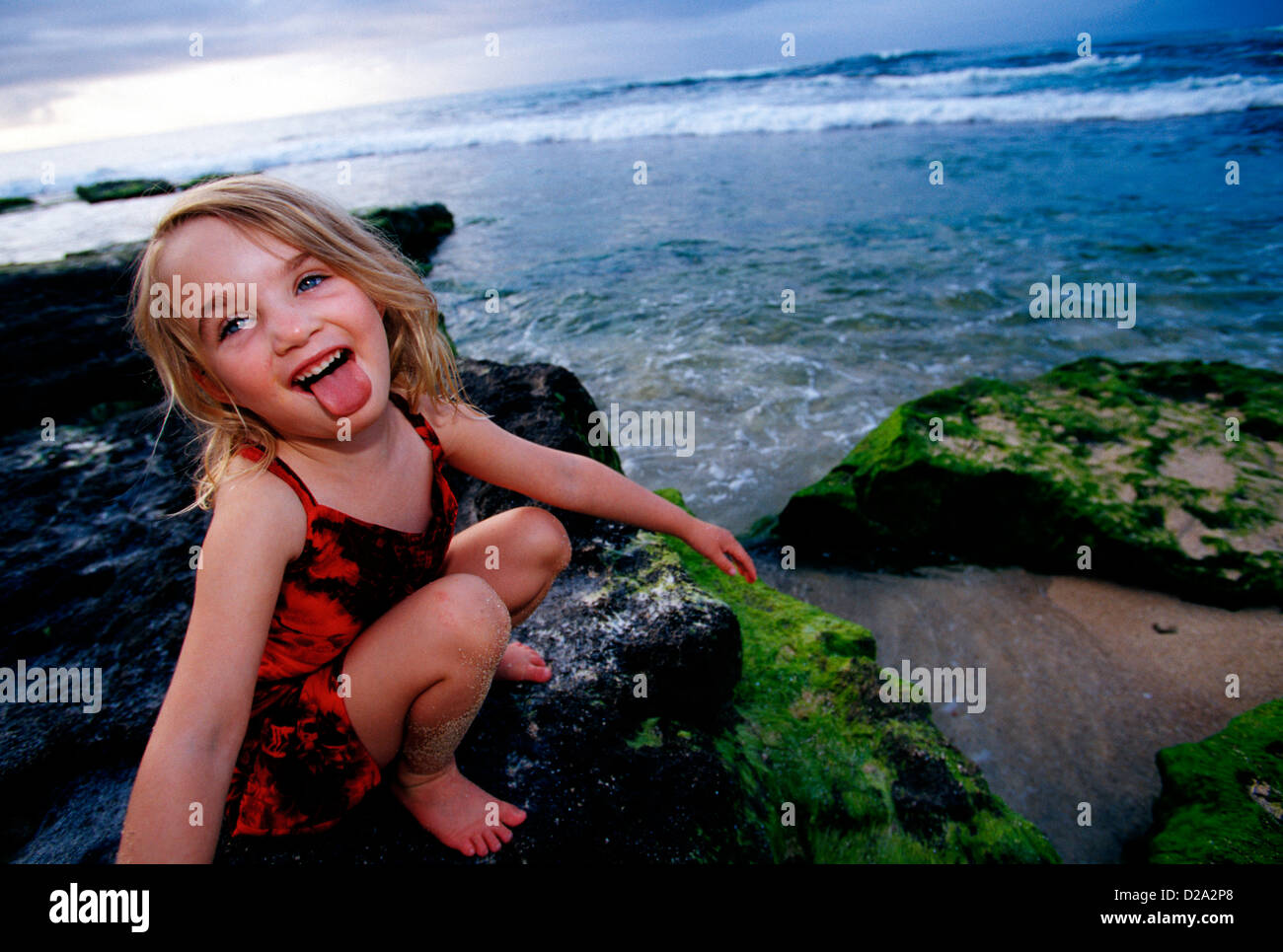 Hawaii, Oahu. Girl Playing On Exposed Reef Stock Photo - Alamy