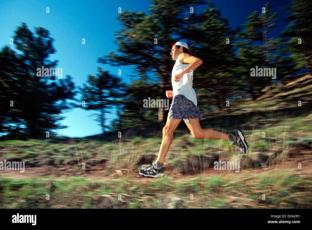 Colorado boulder man running on mount sanitas hi-res stock photography ...