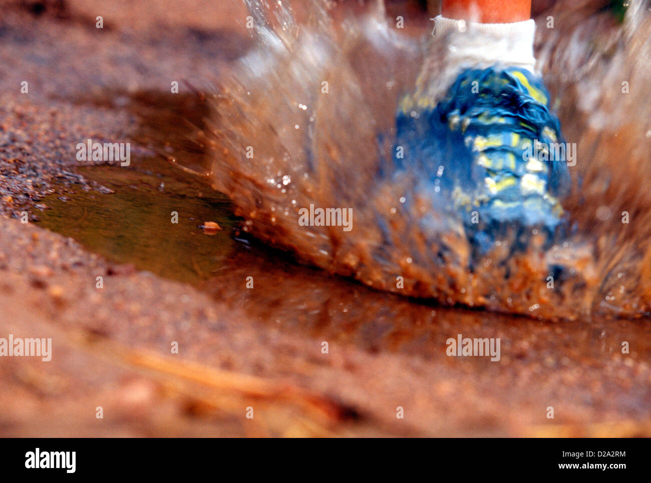 Woman'S Foot With Gore-Tex Lined Trail Running Shoe Running Through Mud ...