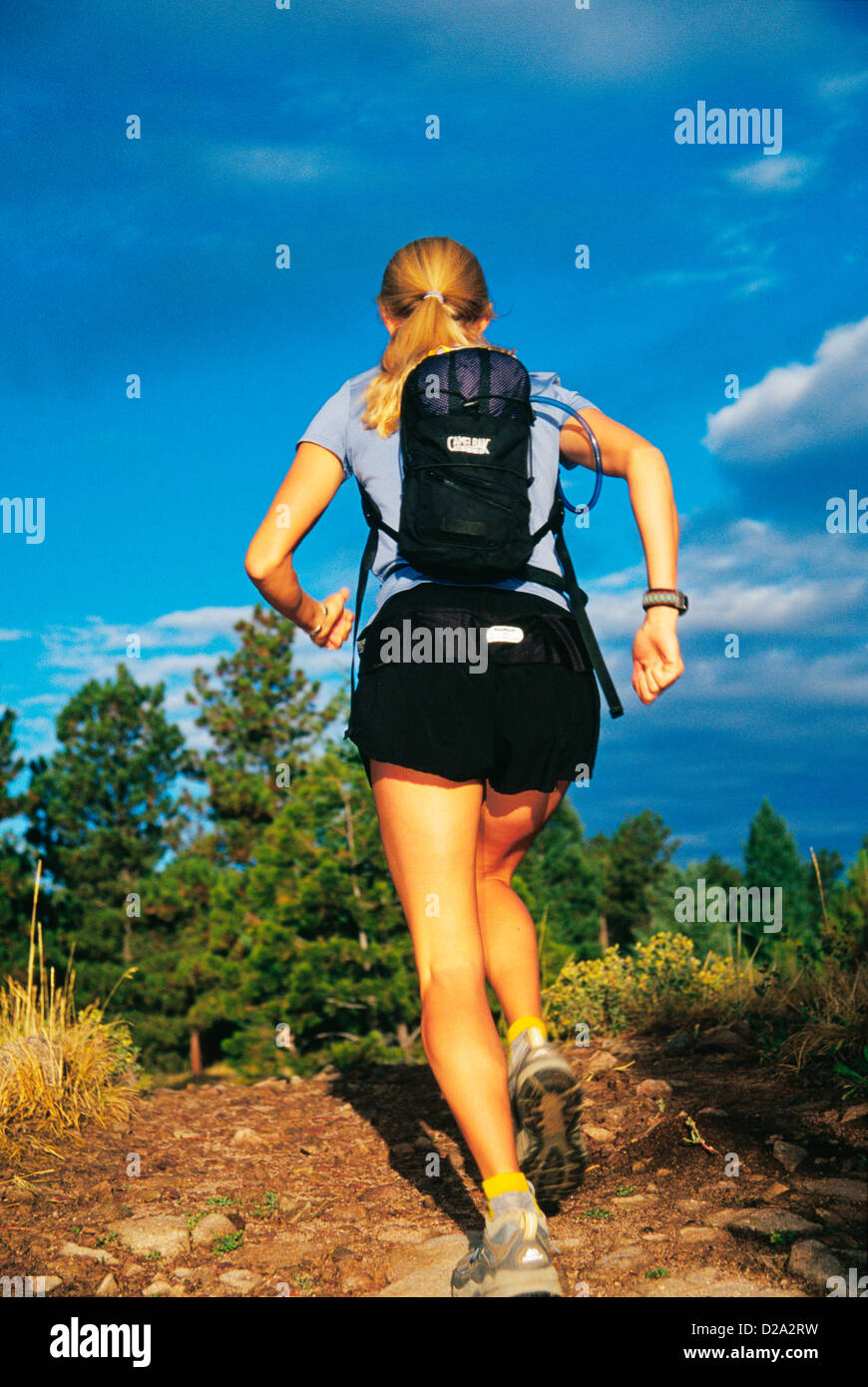 Woman running mountain ridge hi-res stock photography and images - Alamy