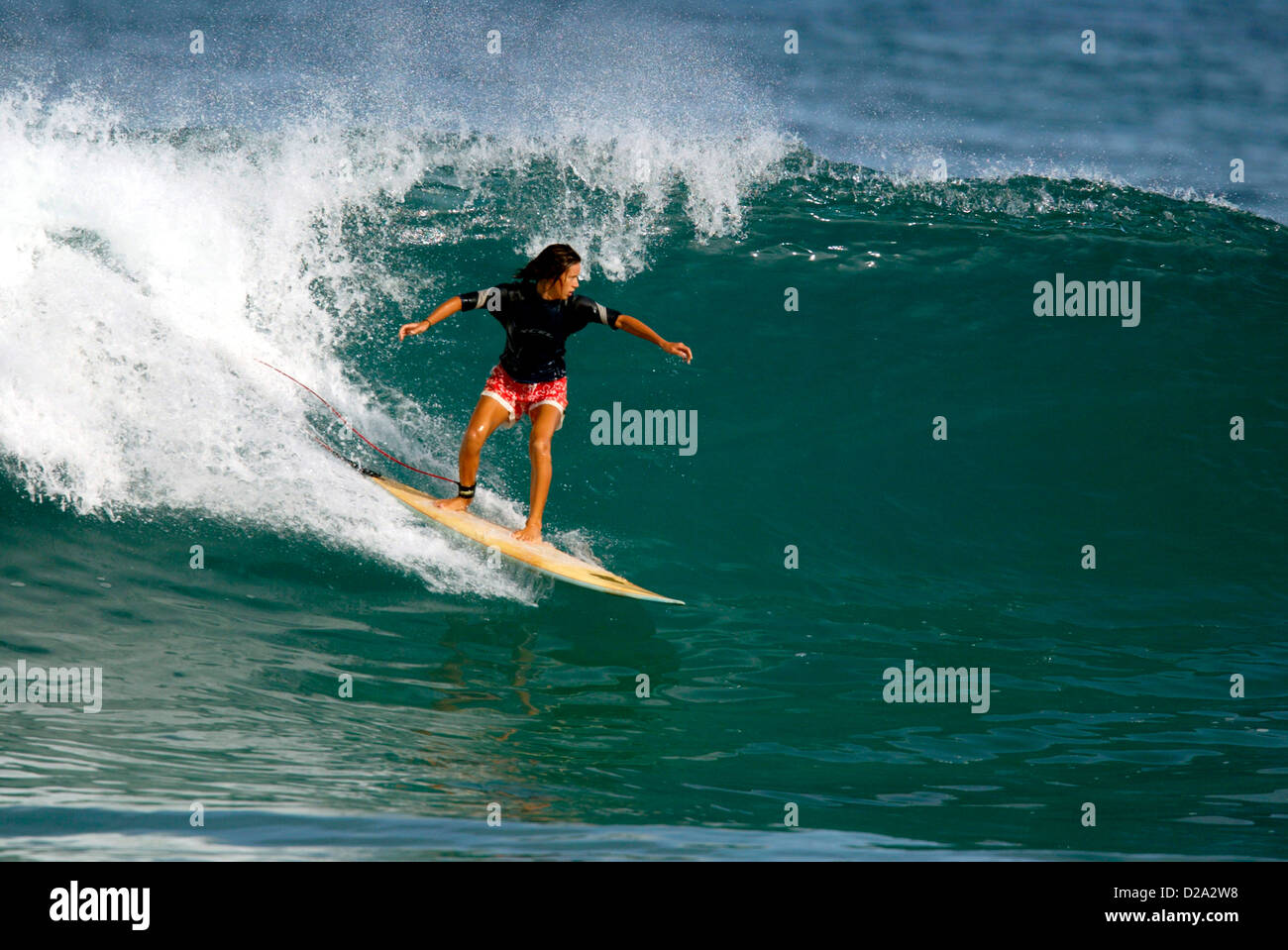 Hawaii, Oahu. Girl Surfing At Rocky Point Stock Photo - Alamy
