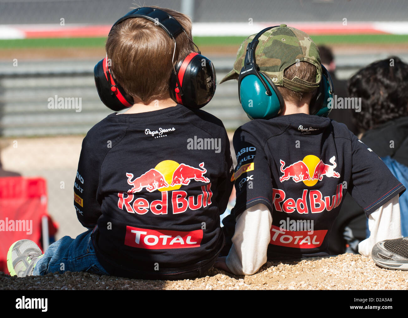 Two young Red Bull Racing fans watch the action during qualification ...