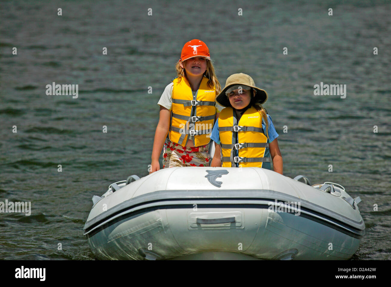 Colorado, Reudi Reservoir, Near Basalt.Two Girls Playing In A Dinghy ...