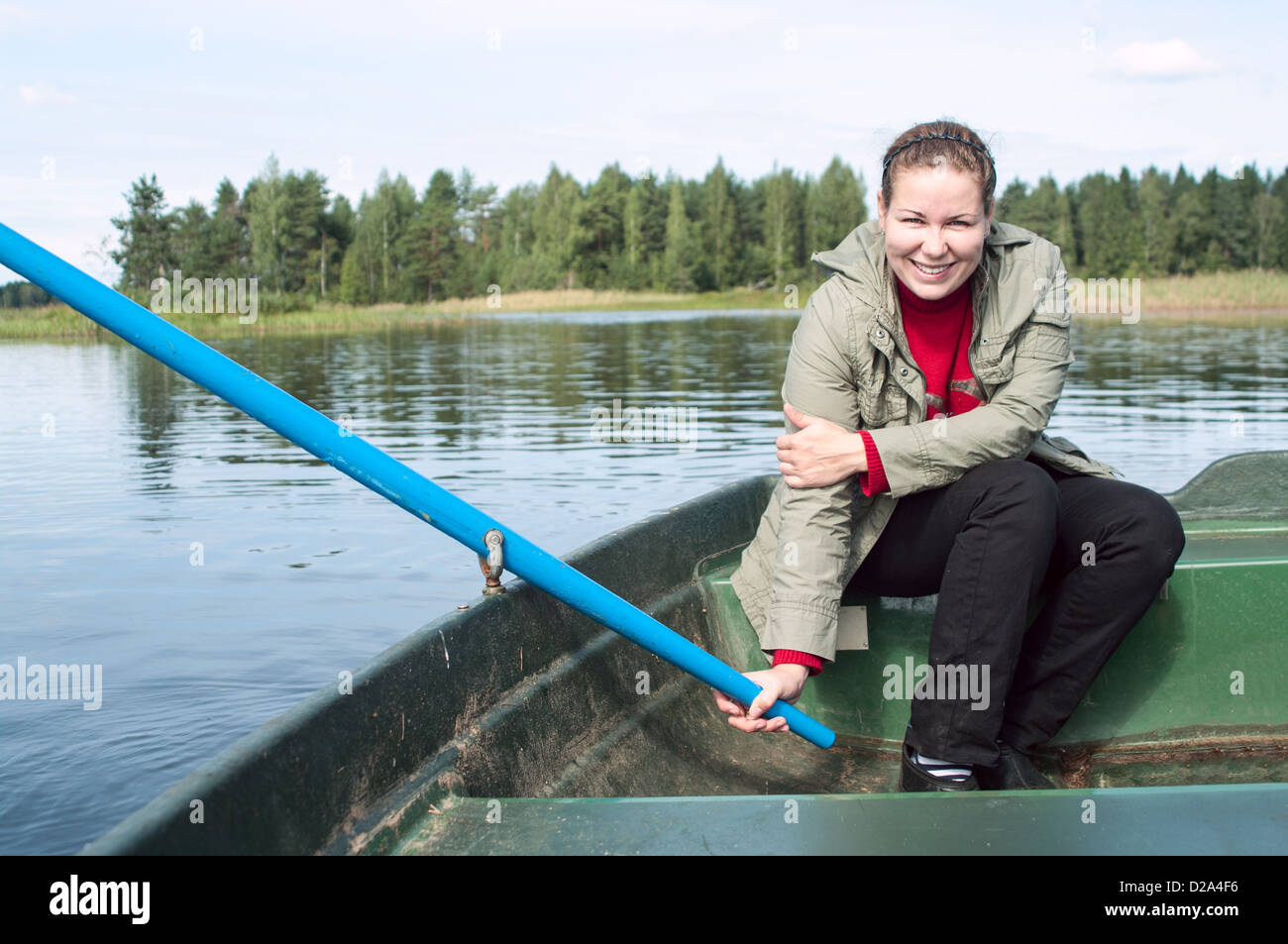 Woman, rowboat, lake, solitude hi-res stock photography and images - Alamy