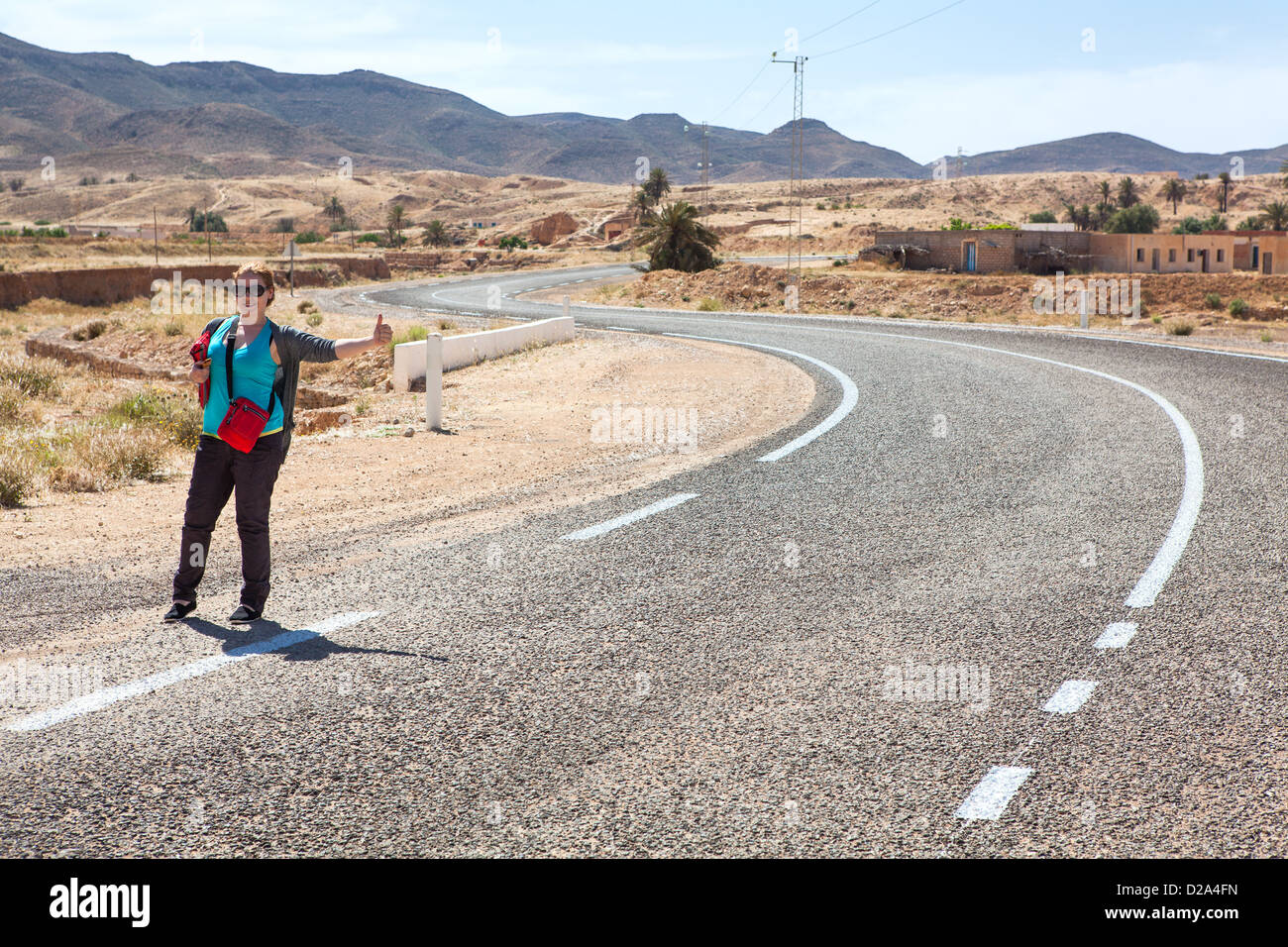 Hitching lift hi-res stock photography and images - Alamy