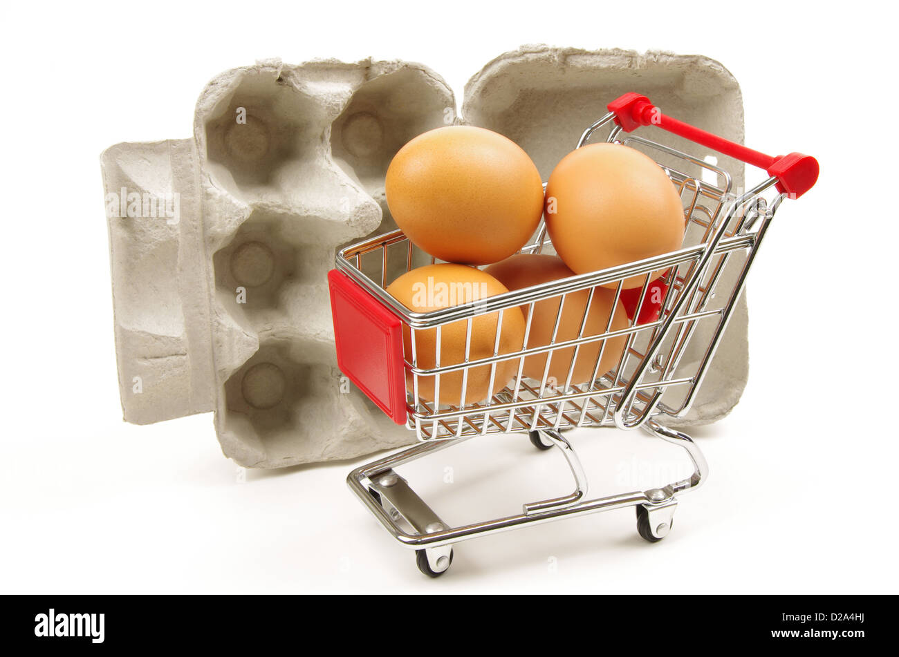 fresh eggs in a shopping trolley and empty egg box Stock Photo - Alamy