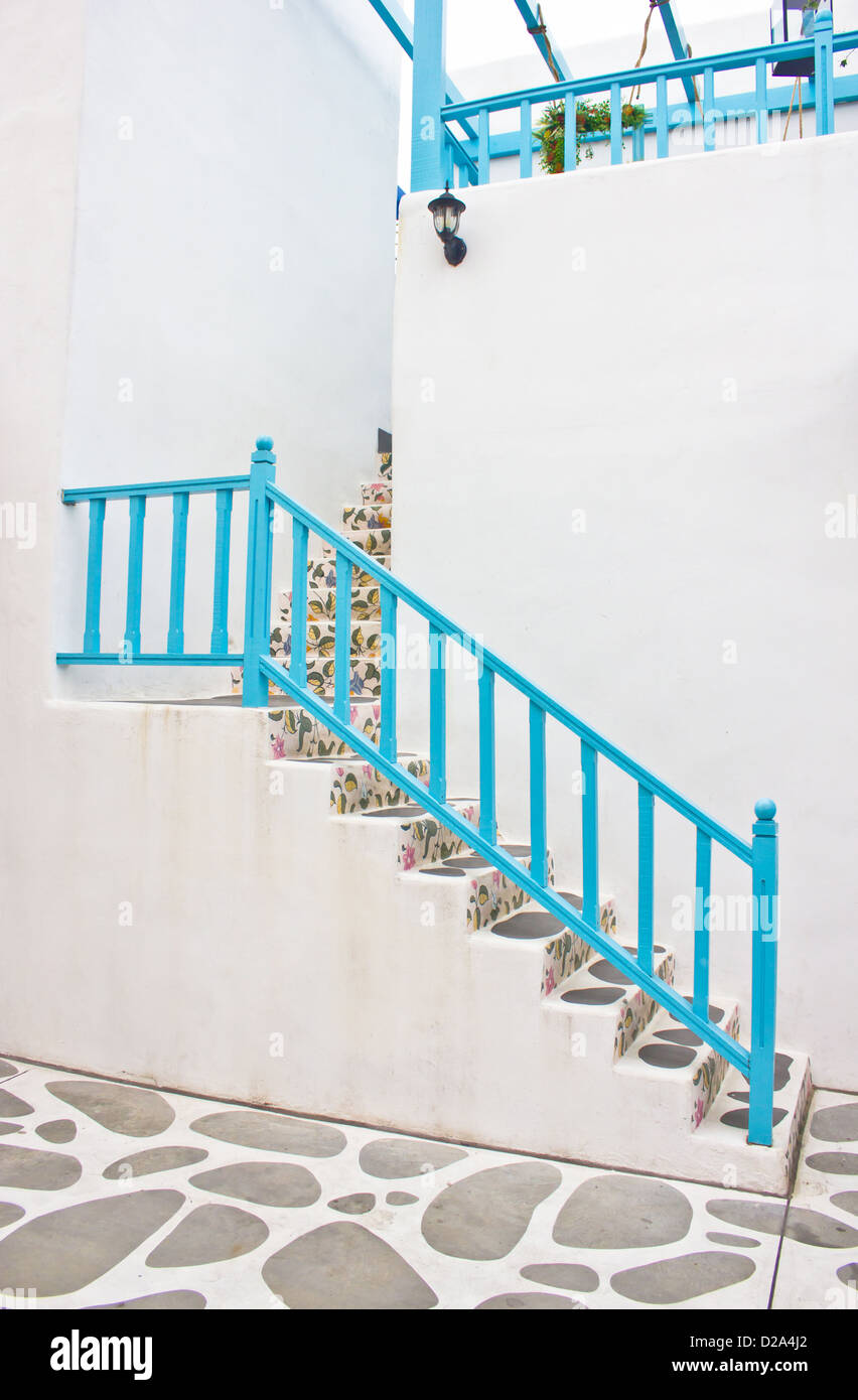 Beautiful ladder with blue handrail Stock Photo - Alamy