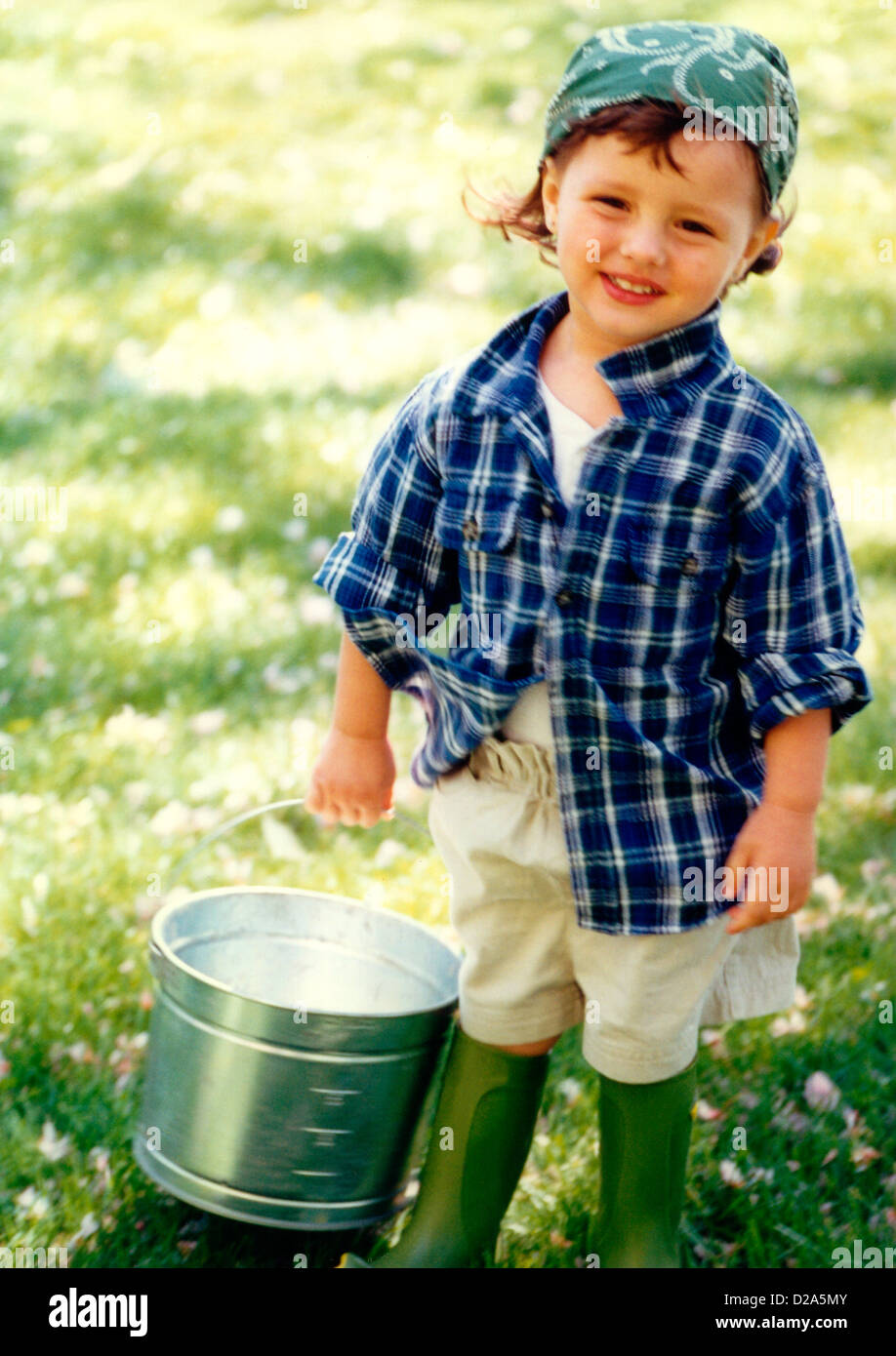 Girl with pail hi-res stock photography and images - Alamy