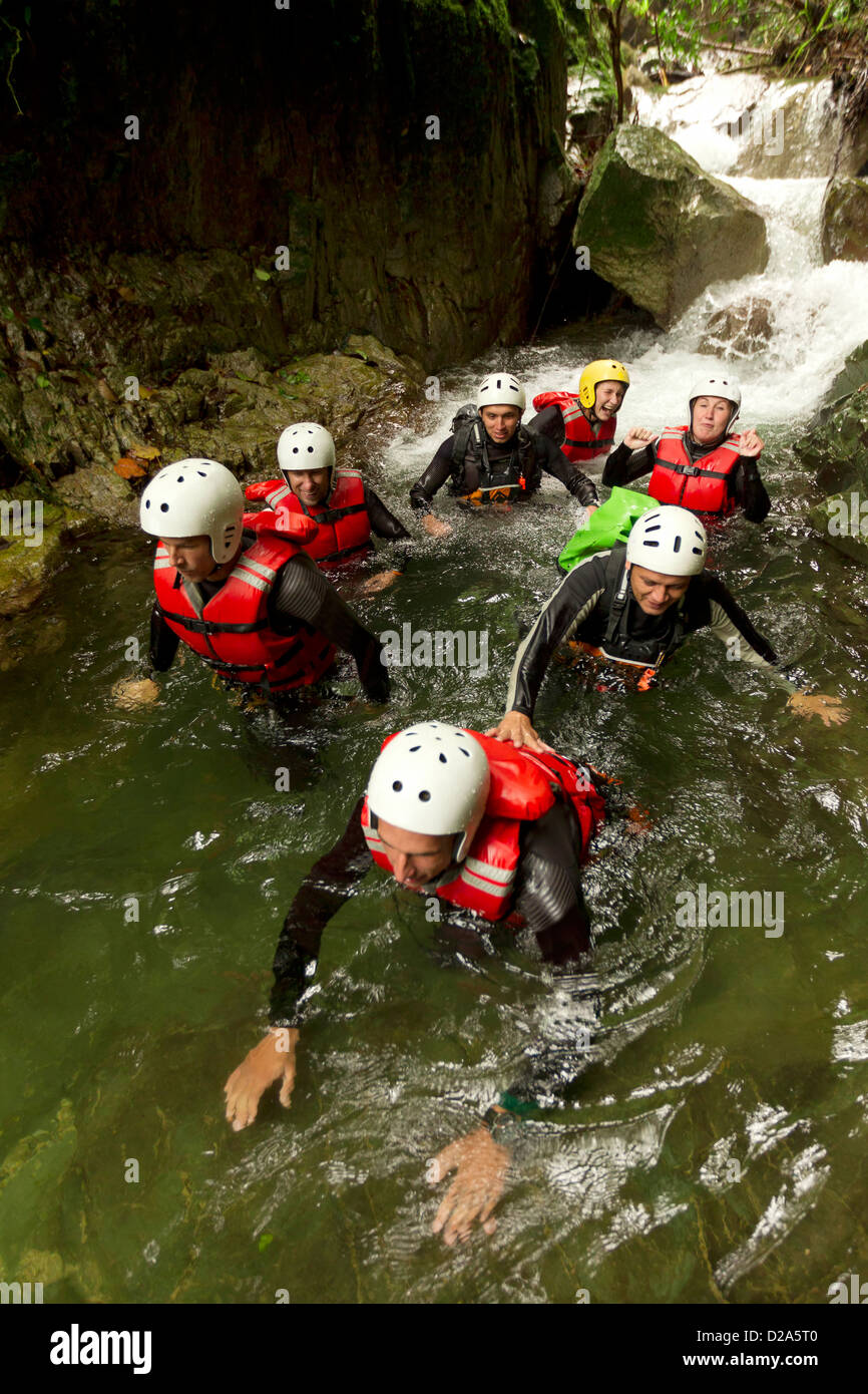 Group Of Active Young People During A Canyoning Expedition In ...