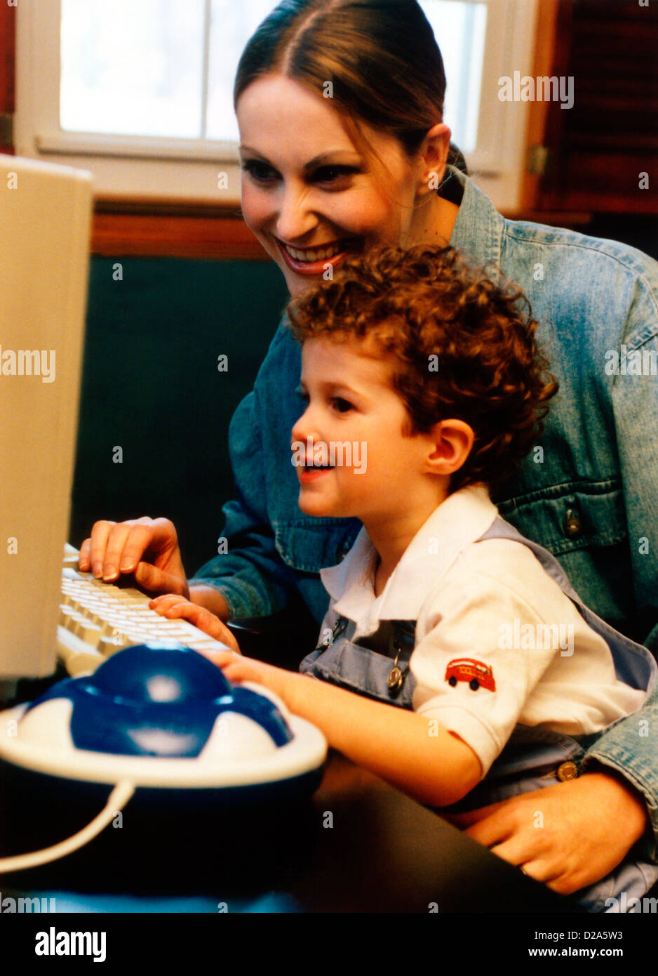 Mother And Son Using Computer Stock Photo - Alamy Mother And Son Using Computer Stock Photo - Alamy