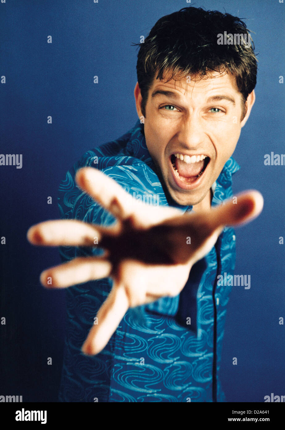Man reaching gesturing towards camera people men portraits portrait ...