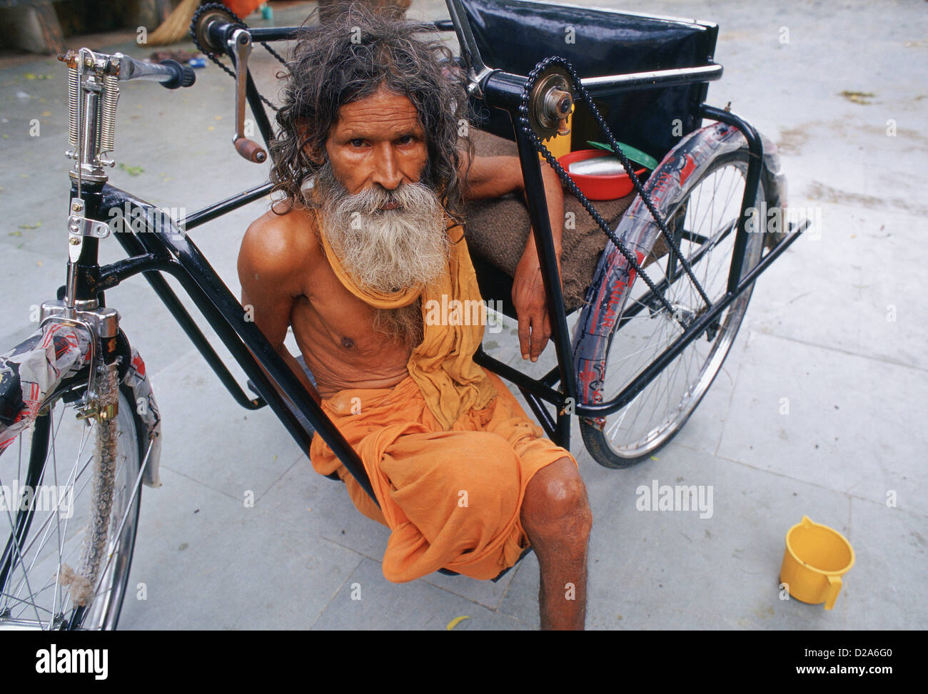 Amputated man with a wheelchair gifted by an Indian NGO ( India Stock ...