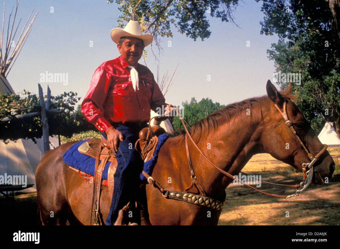 Montana, Crow Fair. Man On Horseback, Wearing Cowboy Hat Stock Photo ...