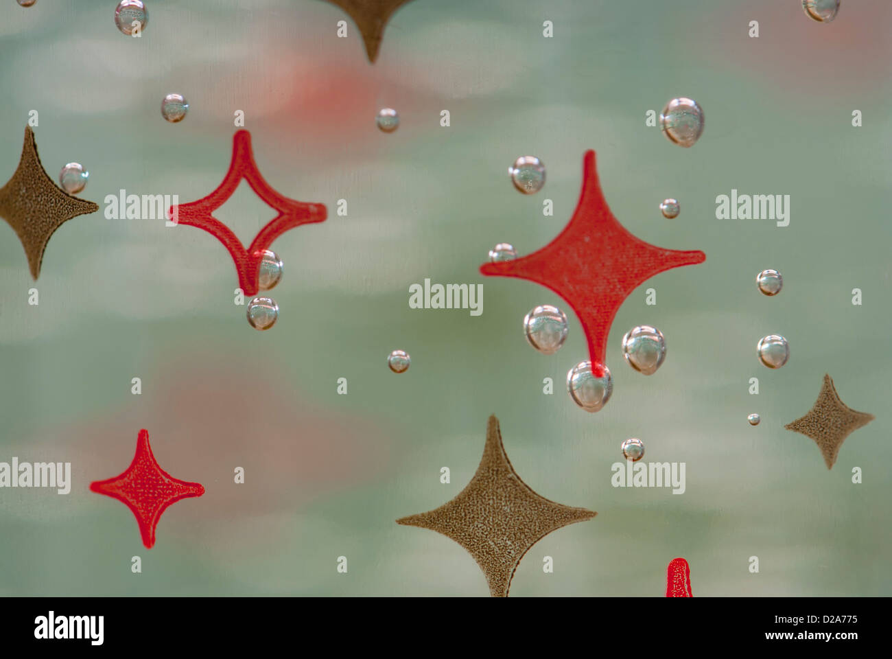 Soda bubbles in patterned glass Stock Photo - Alamy