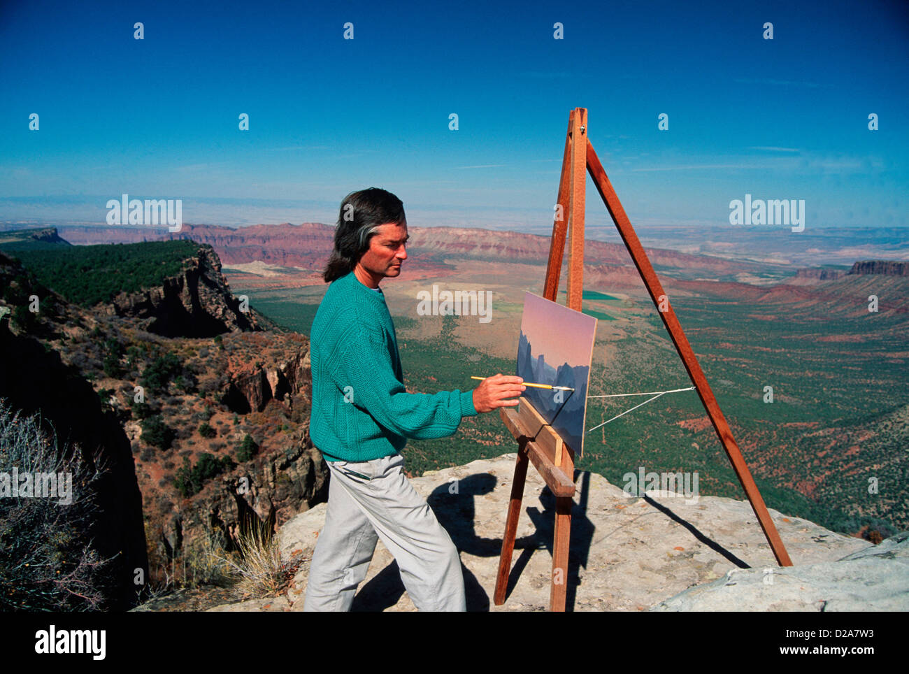 Utah moab artist painting in front of scenic view hi-res stock ...