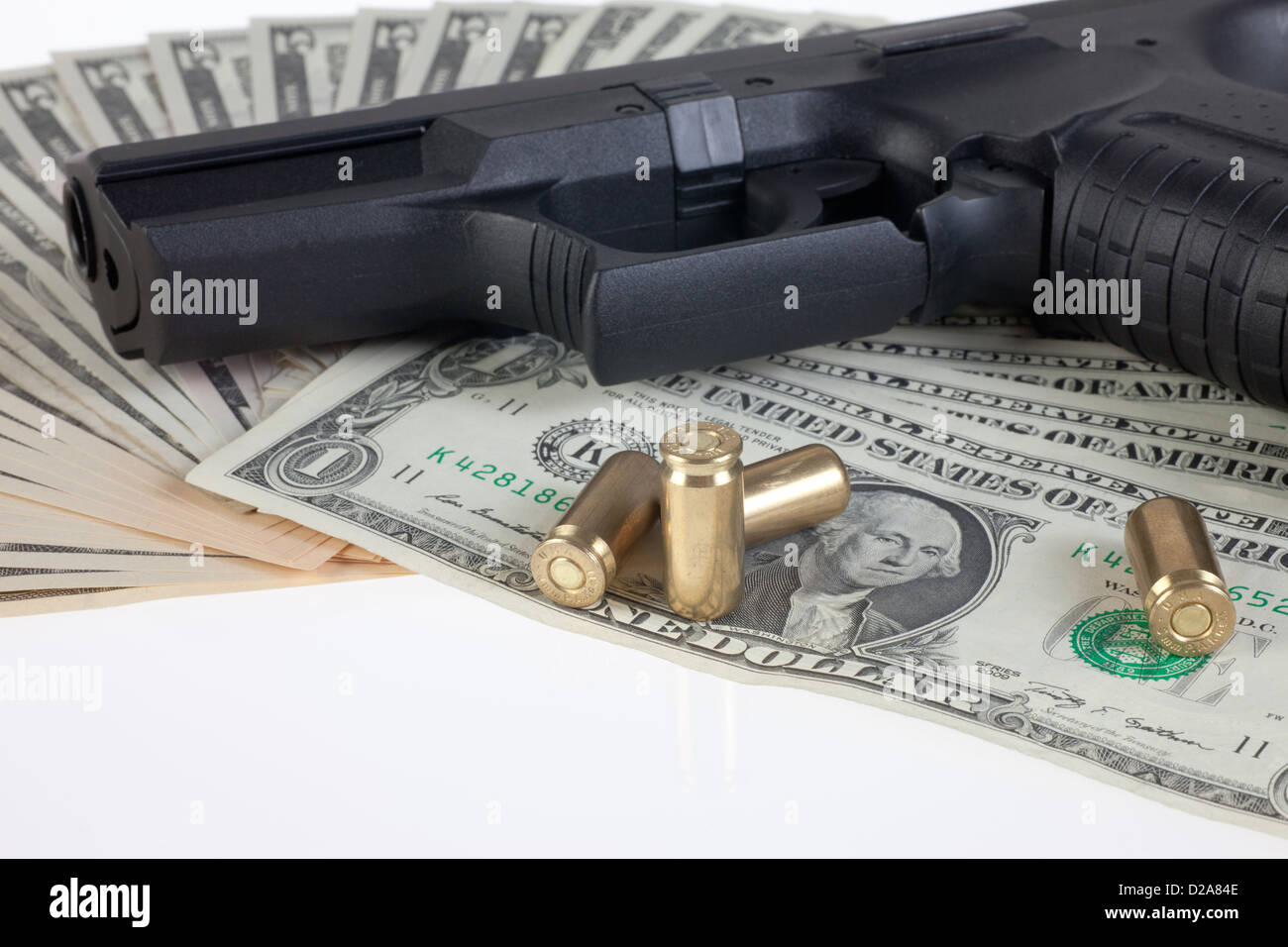 Berlin, Germany, U.S. dollar bills fanned with a weapon Stock Photo - Alamy