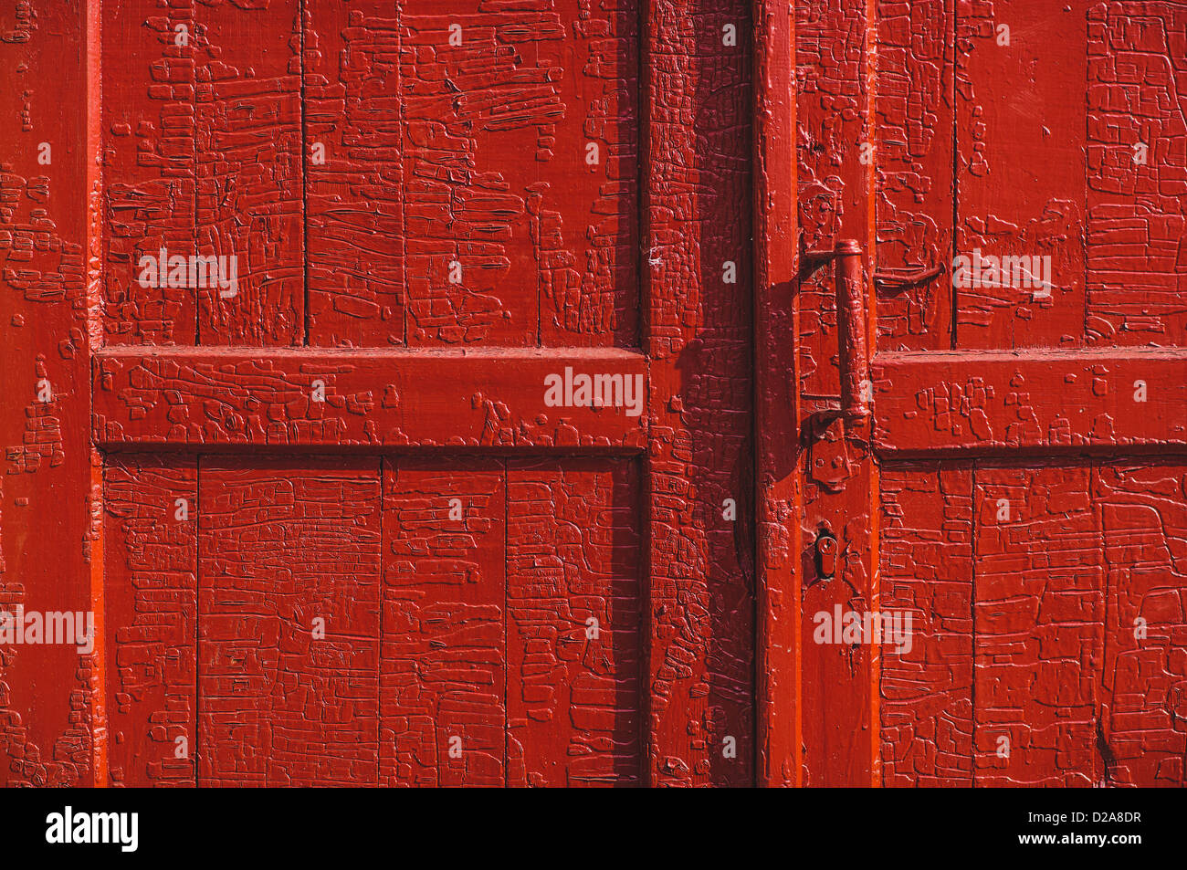 An old wood door with cracked red paint and grunge Stock Photo - Alamy