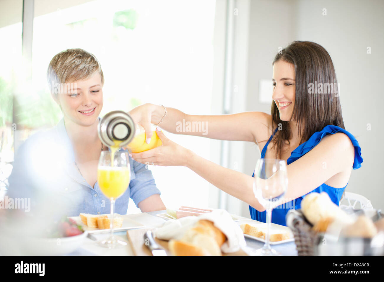 Women having breakfast together Stock Photo - Alamy