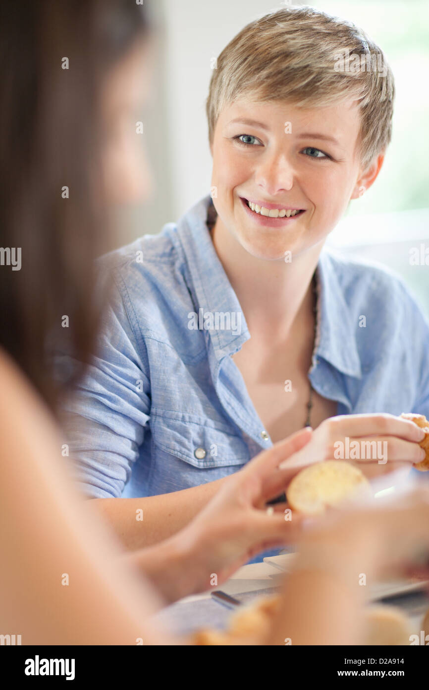 Women eating breakfast together Stock Photo - Alamy