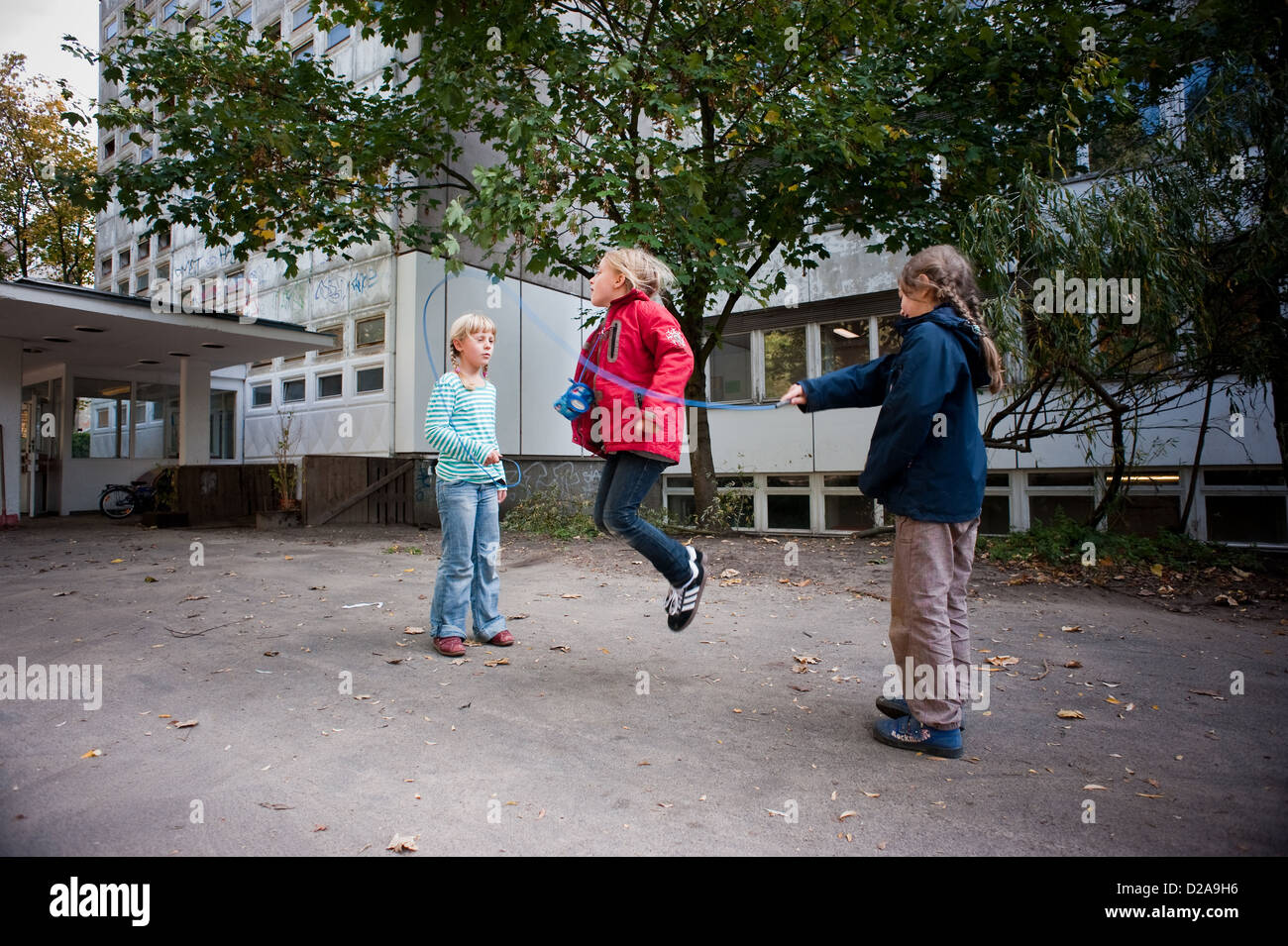 Children skipping with rope hi-res stock photography and images - Alamy