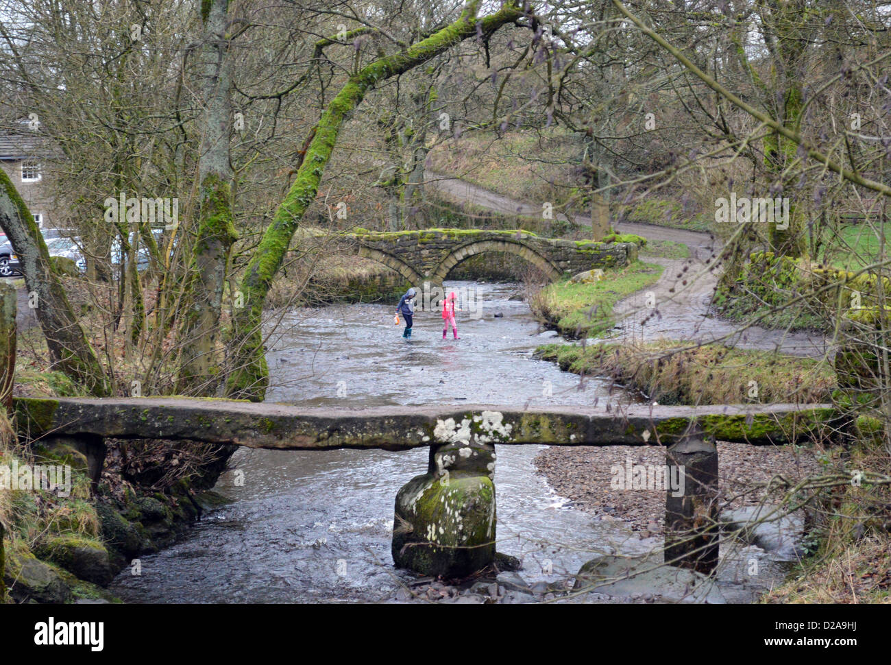 Two Young Girls Walking Through the Ford Between the Packhorse and ...