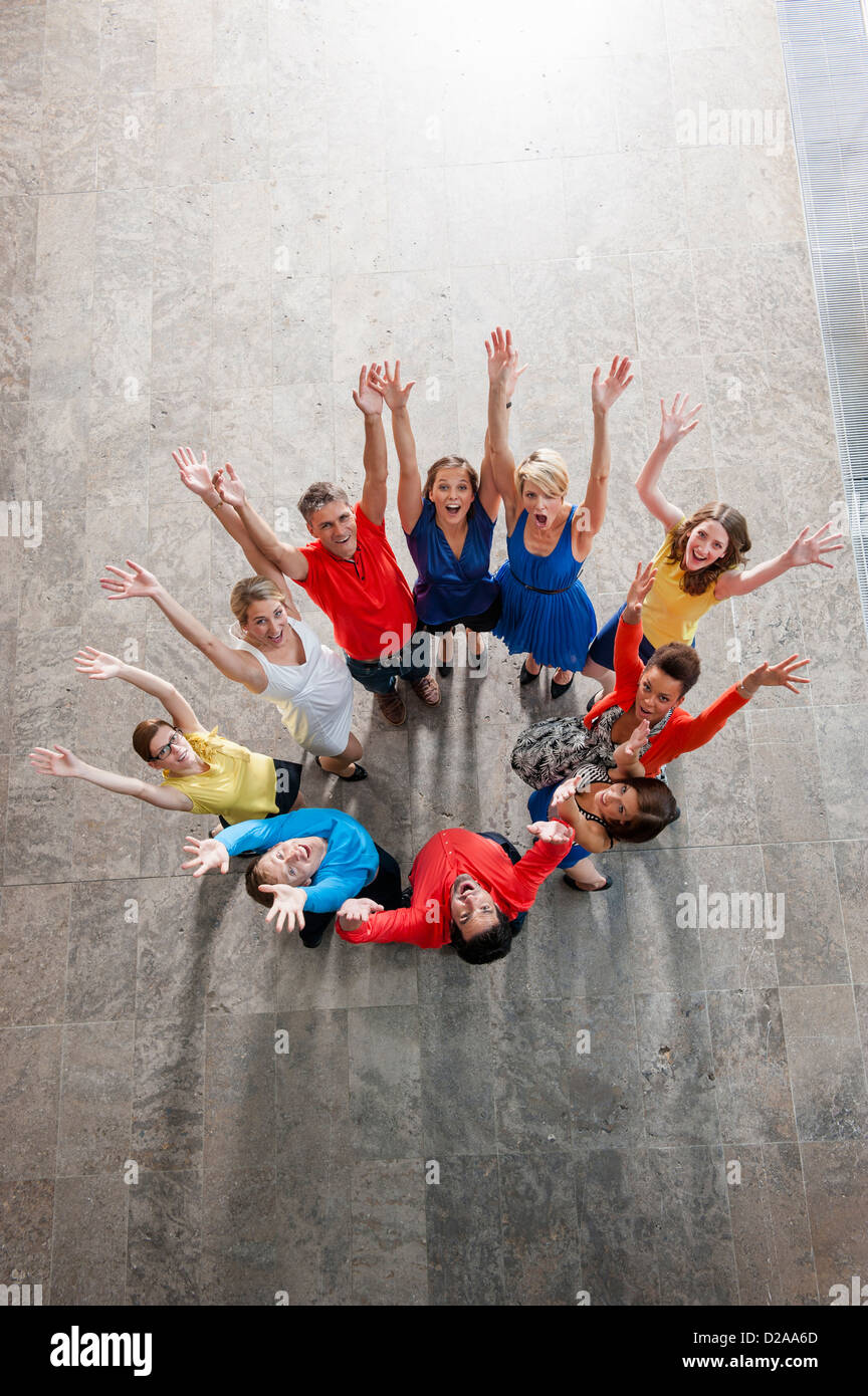 Overhead view of people cheering Stock Photo - Alamy