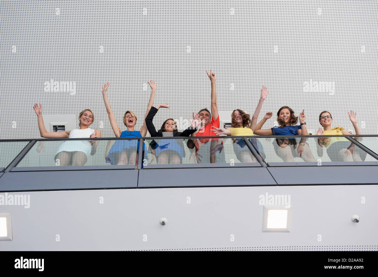 Waving down from balcony hi-res stock photography and images - Alamy