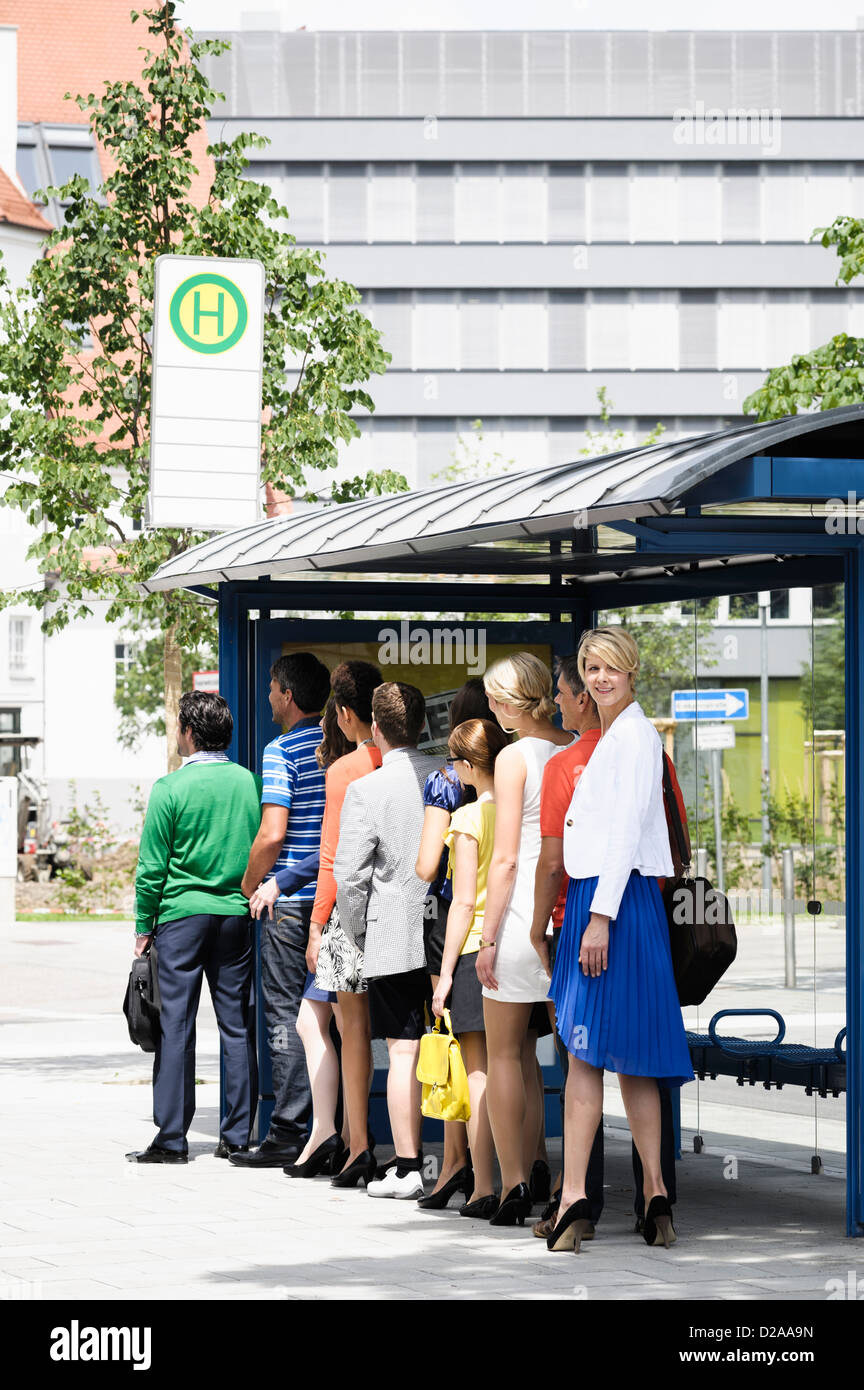 People Waiting At A Bus Stop High Resolution Stock Photography and ...