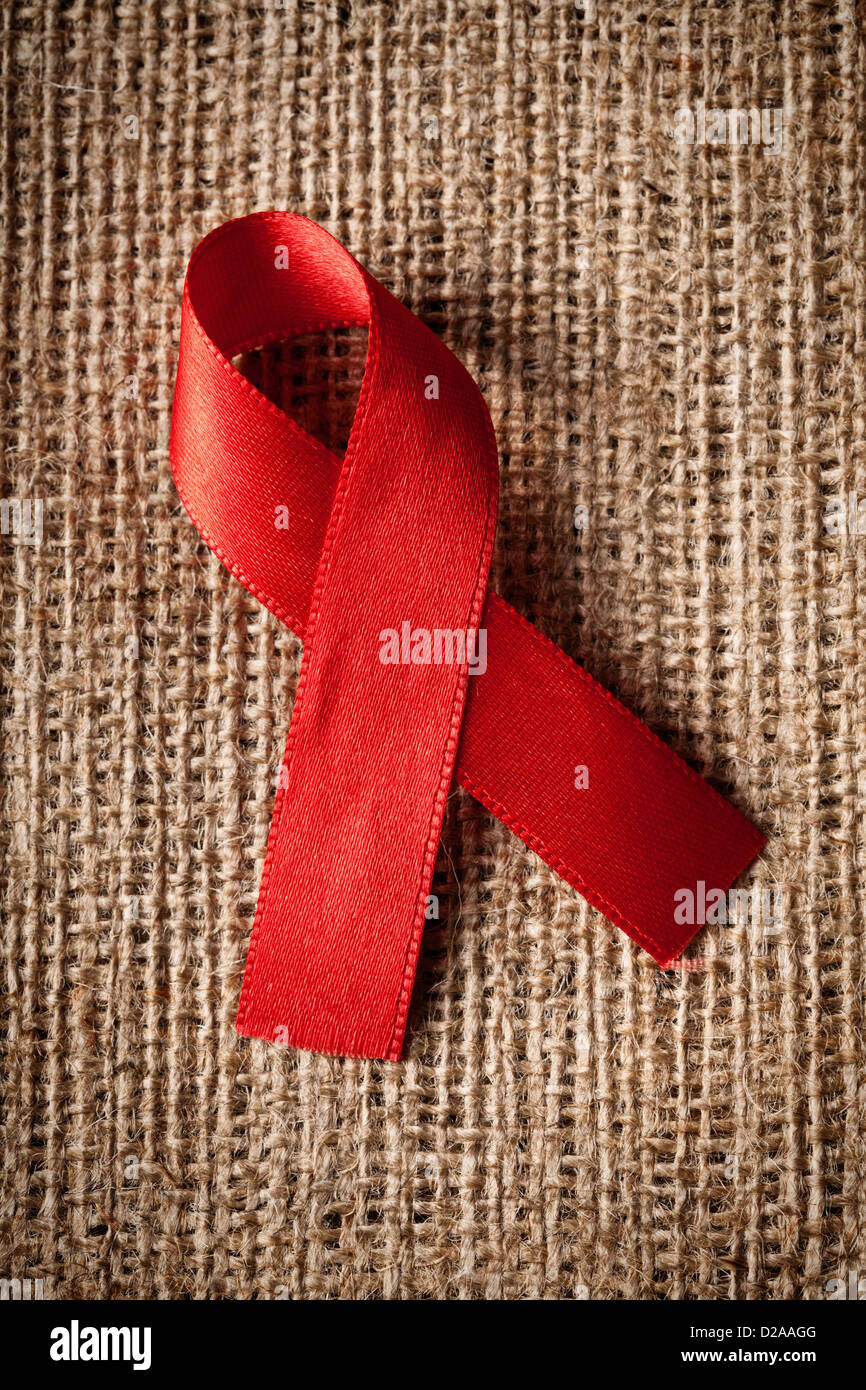 red ribbon aids awareness Stock Photo - Alamy