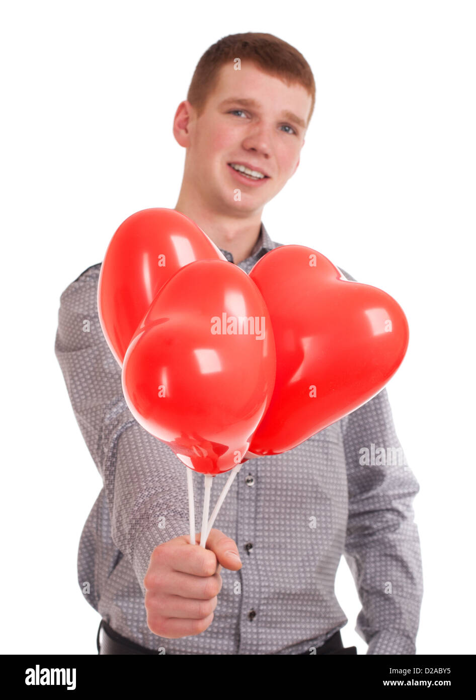 Portrait of a young man with balloons Stock Photo - Alamy